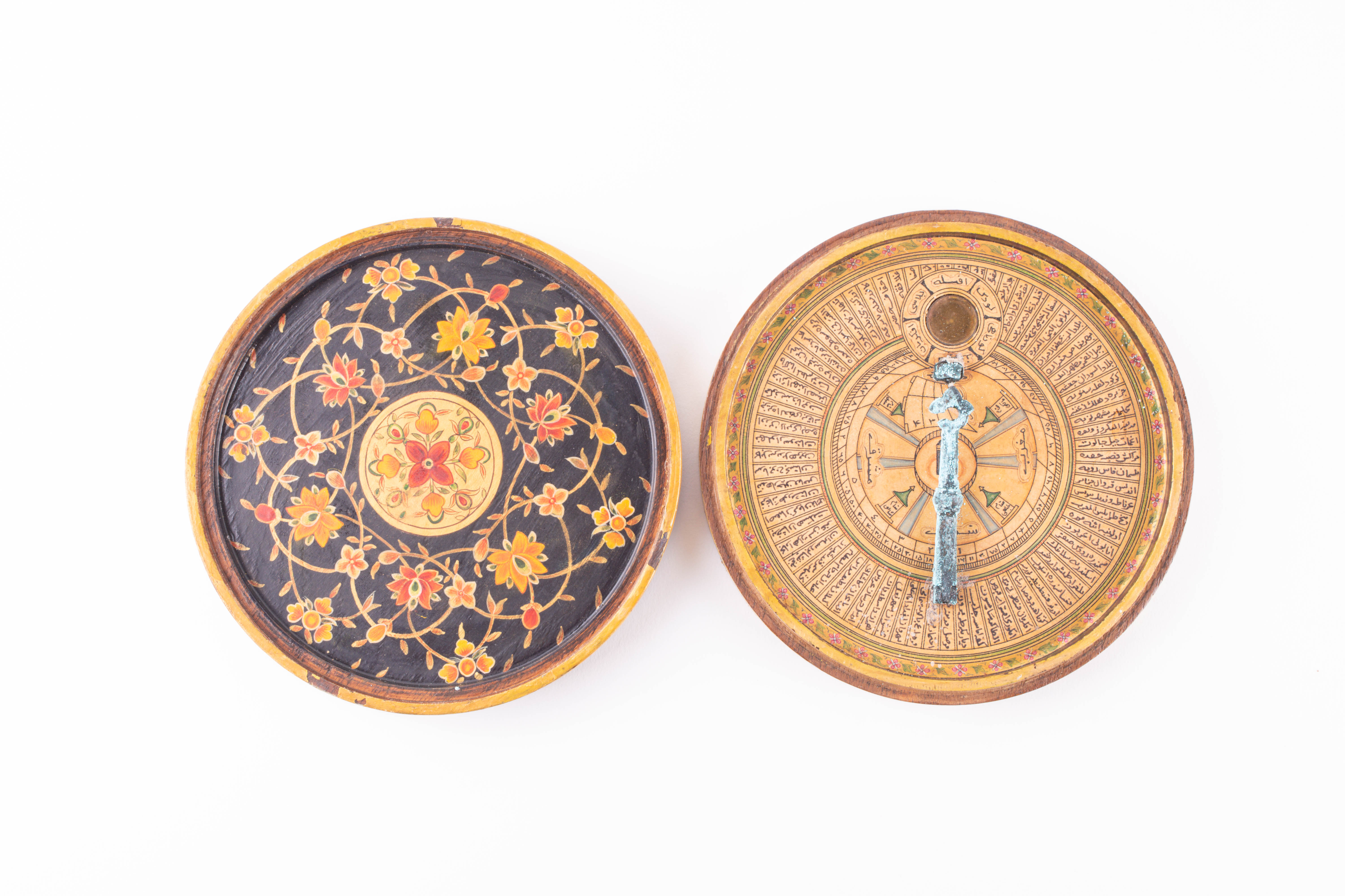 Lot 160 - A Persian lacquer Qibla indicator and