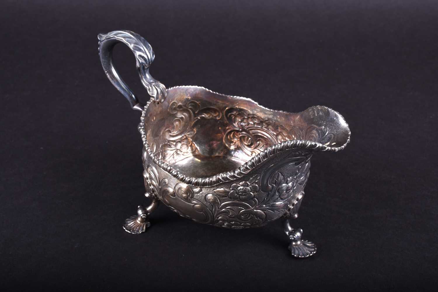 Lot 612 - An early Geo III silver gravy boat, Daniel