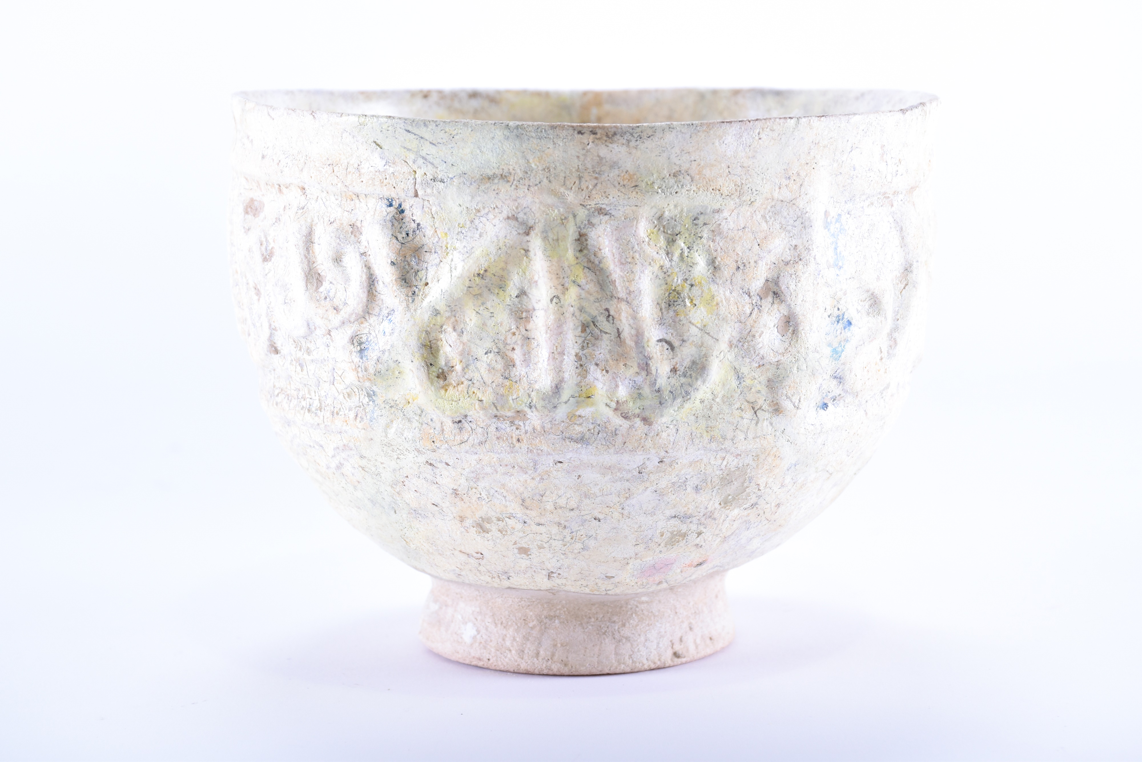 Lot 191 - A medieval Islamic pottery bowl with moulded