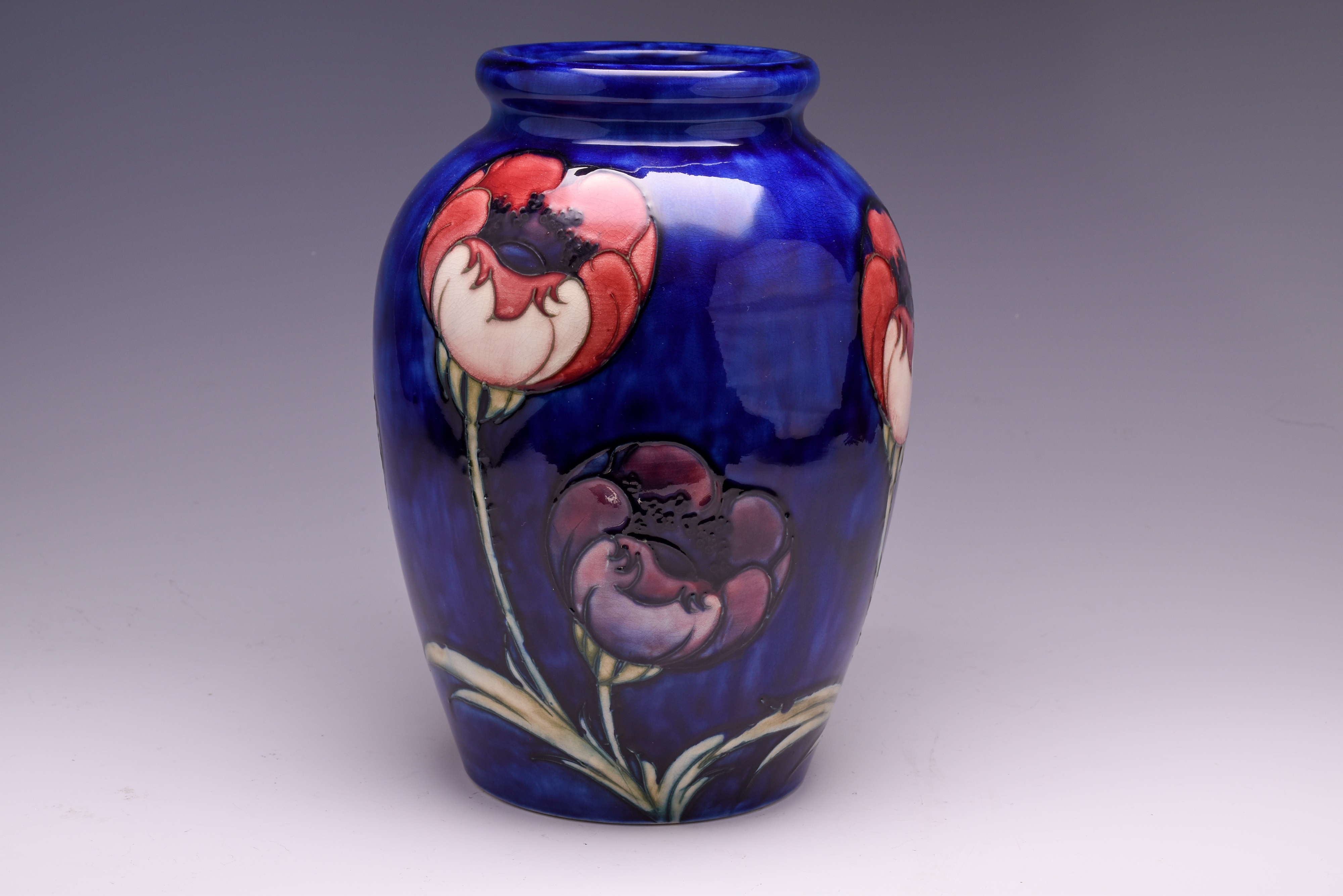 Lot 11 - A large Moorcroft Poppy pattern vase, mid
