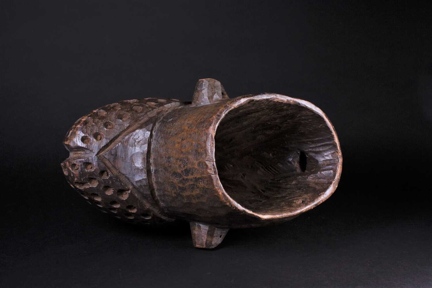 Lot 35 - A Bamileke helmet mask, Cameroon, an