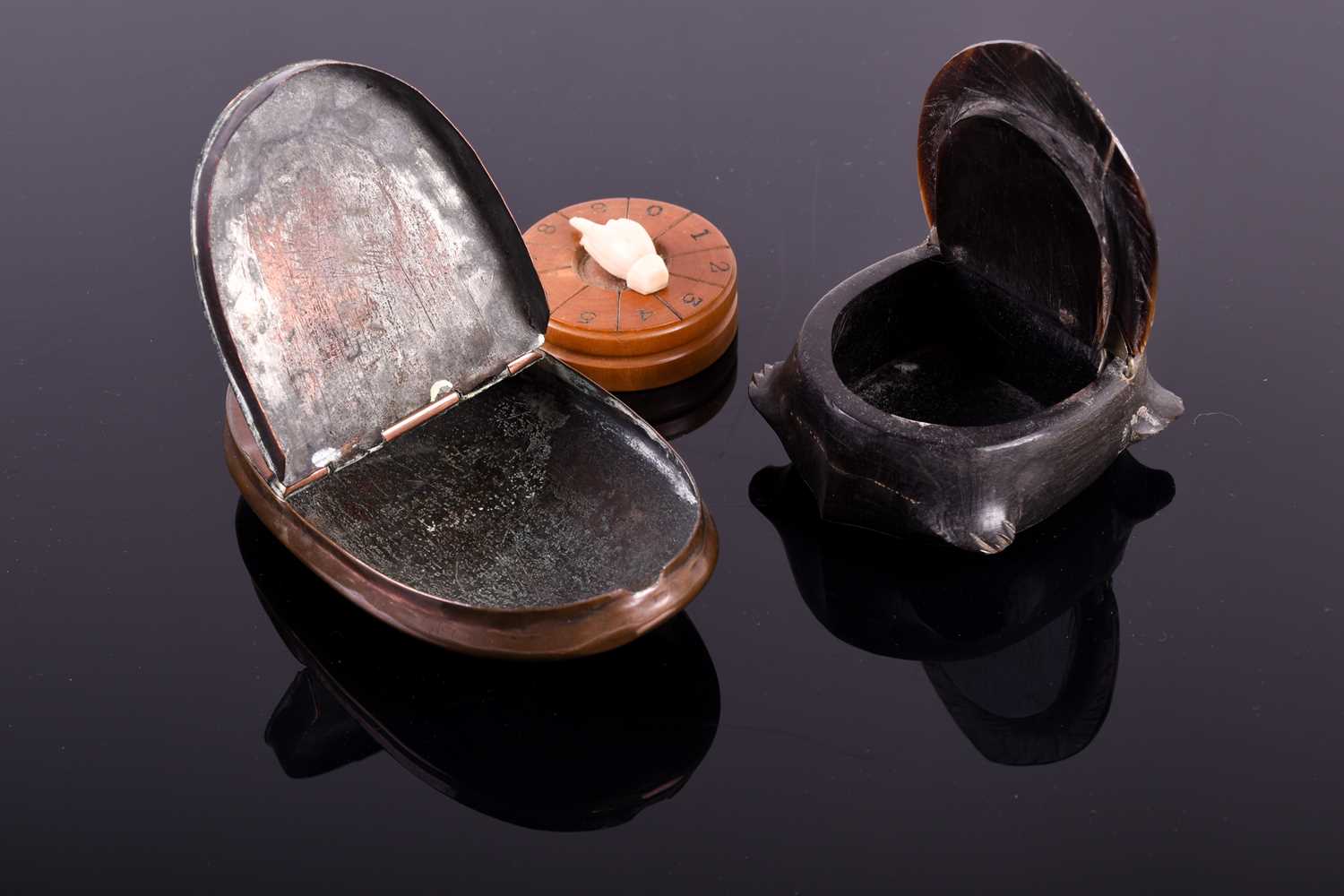 Lot 435 - A 19th century carved horn snuff box in the