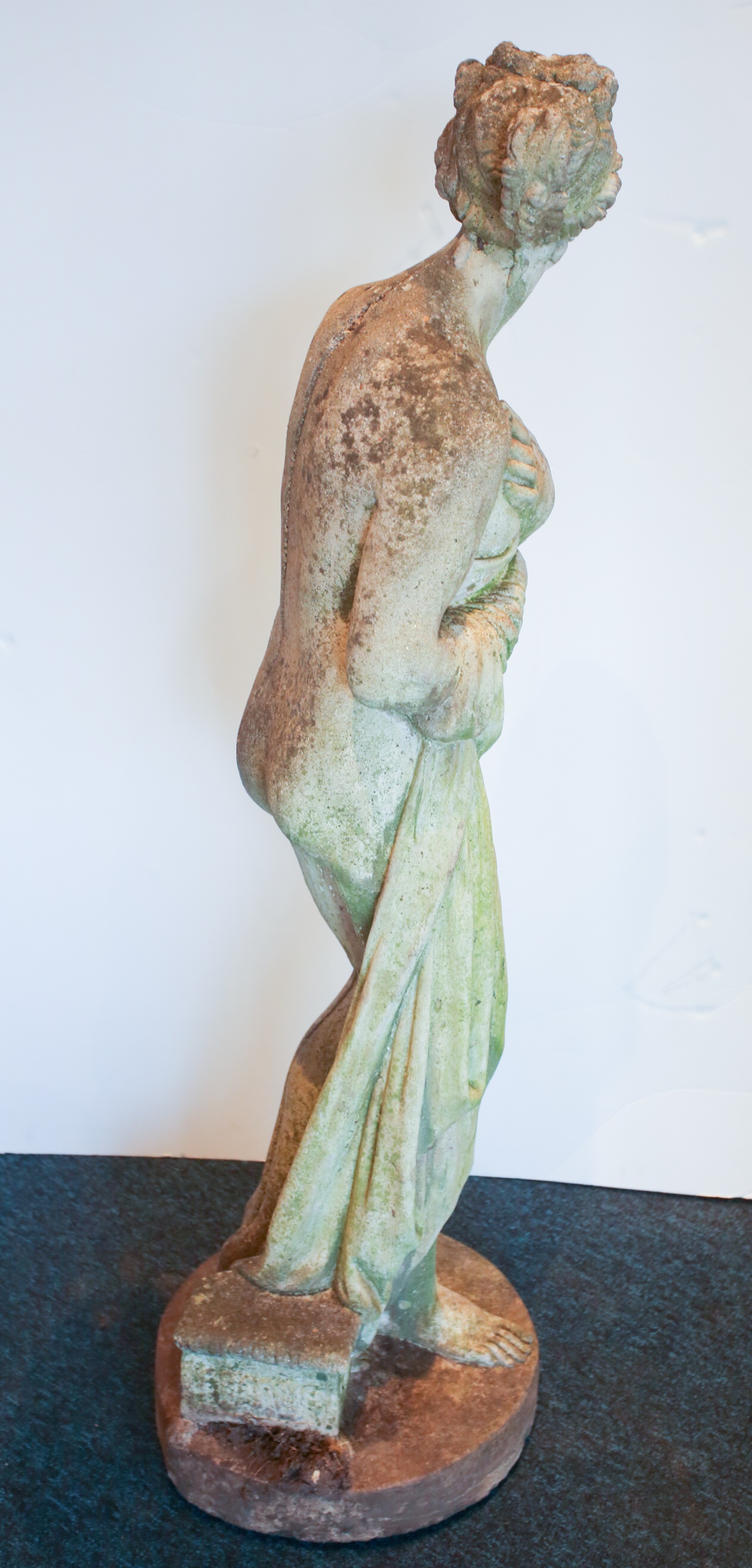 Lot 360 - A composite stone garden statue, 'Bathing