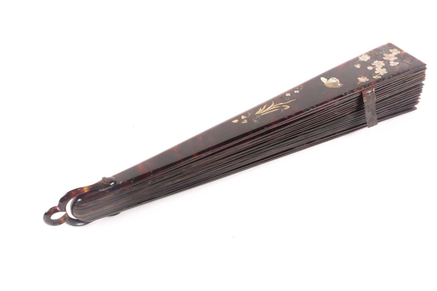 Lot 47 - A Japanese tortoiseshell fan, Meiji period,