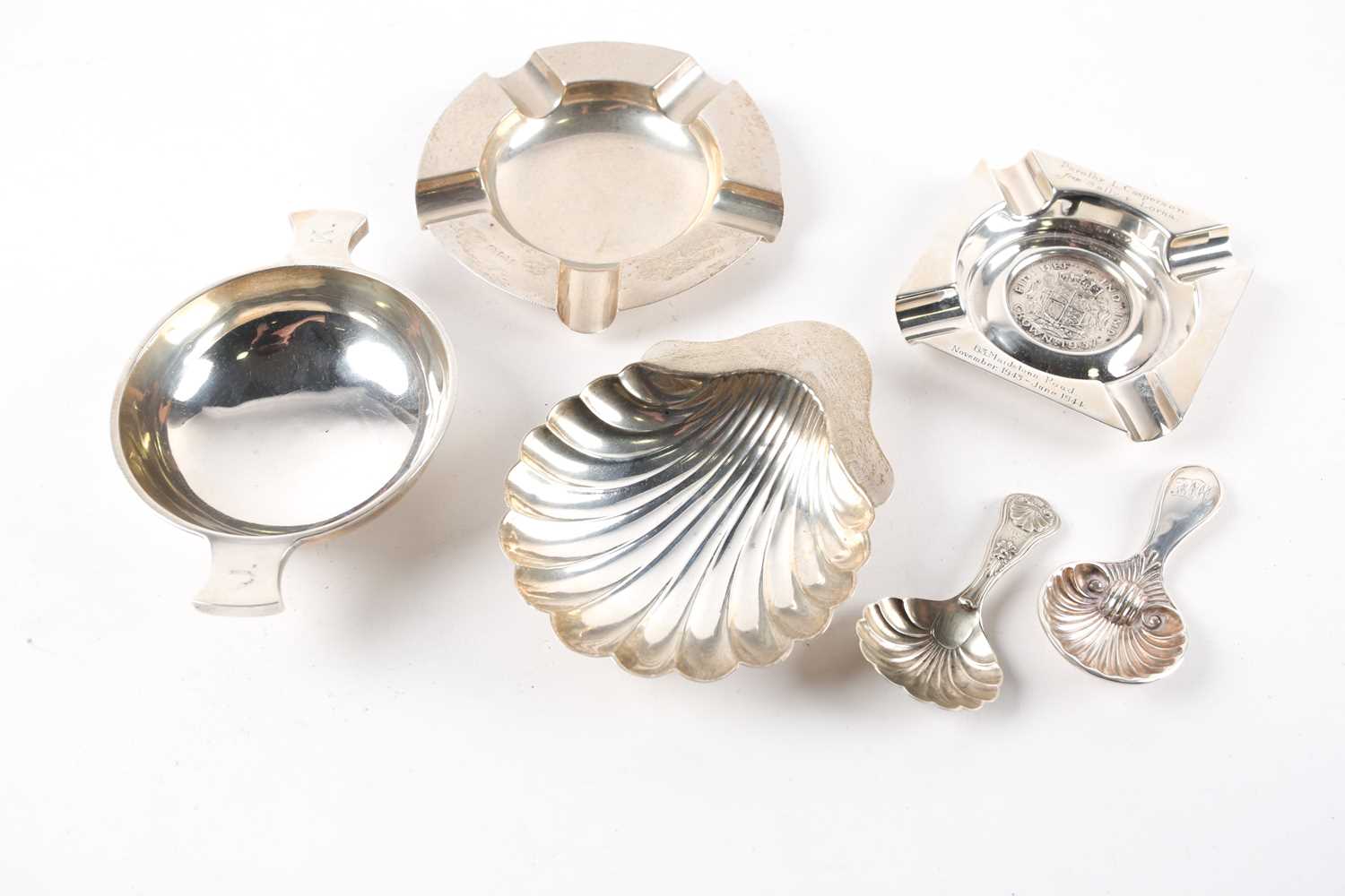 Lot 436 - A silver caddy spoon with shell shaped bowl,