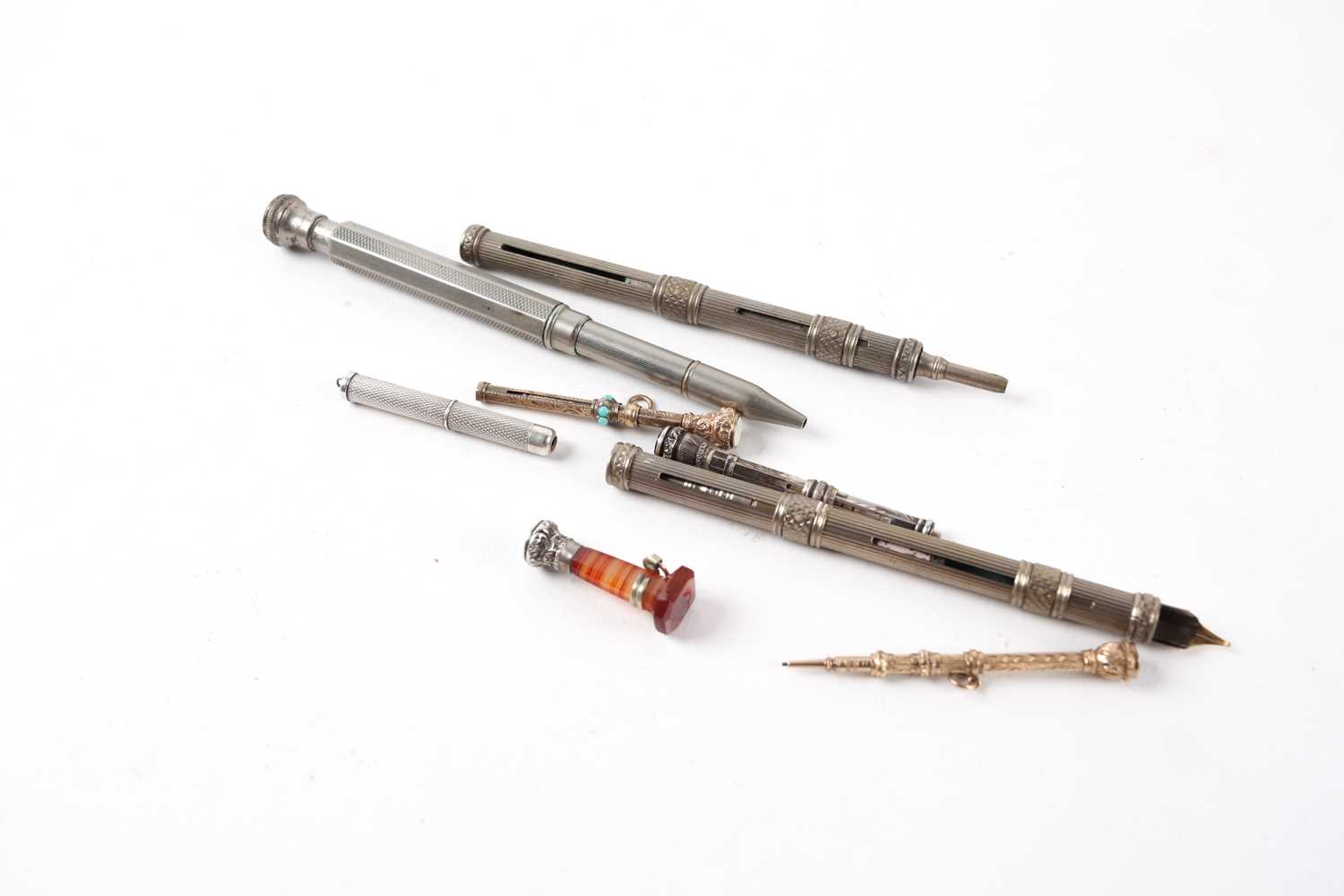 Lot 445 - Two Victorian gilt propelling pencils,