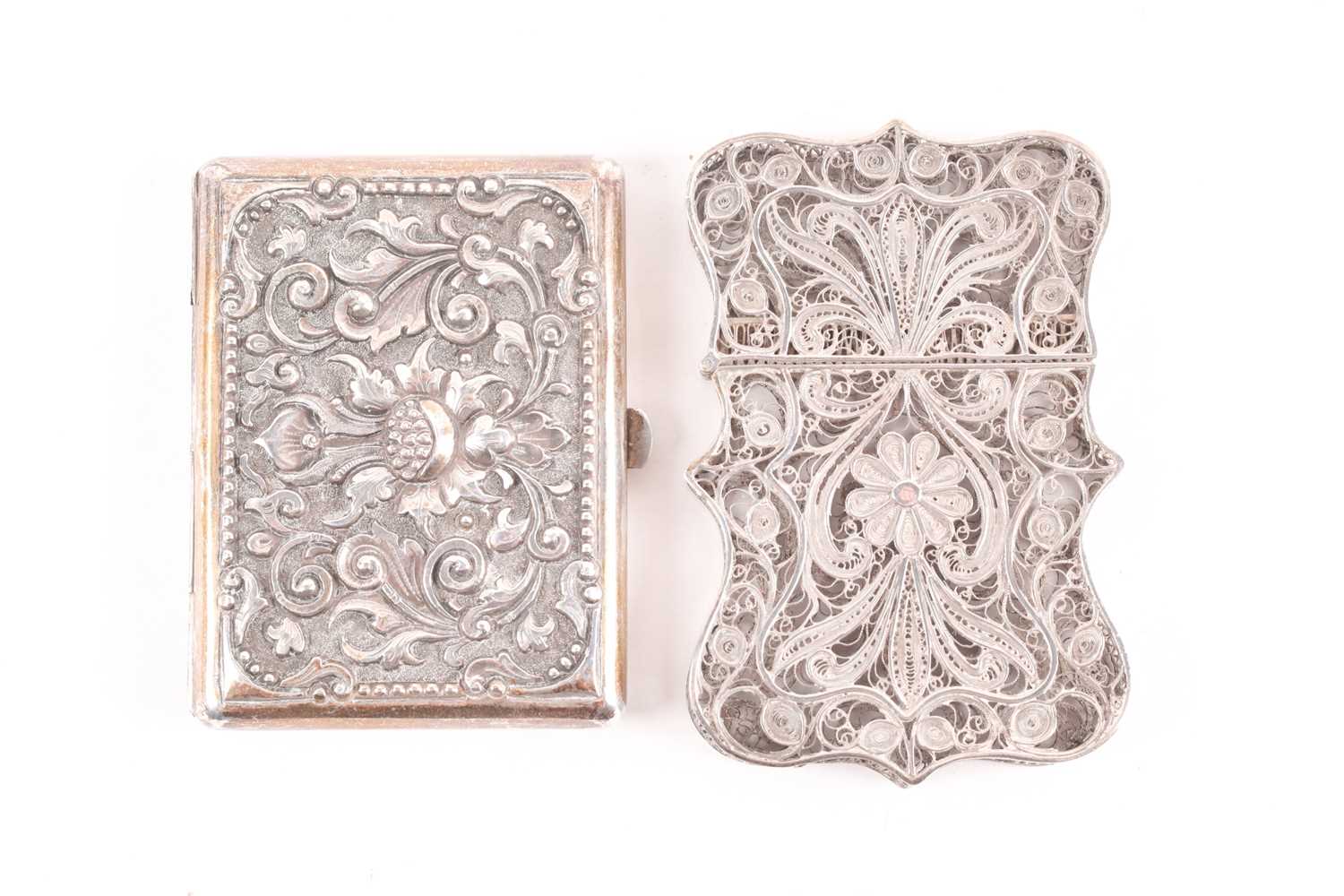 Lot 541 - An Indian filigree white metal card case and