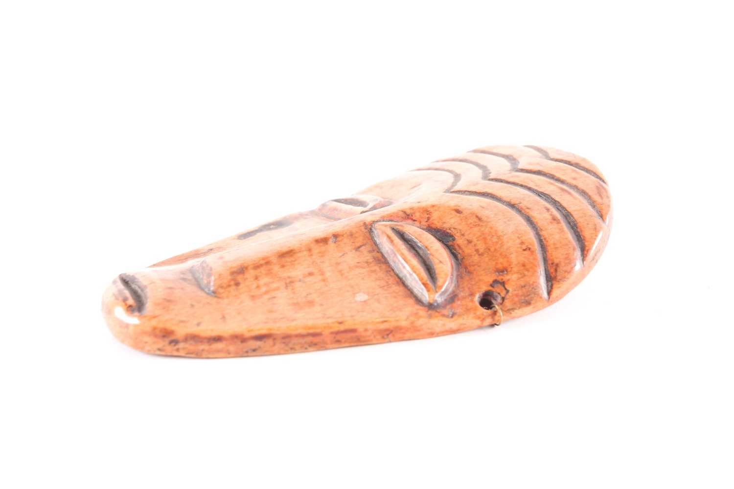 Lot 237 - A Lega (Idimu) animal bone Bwami mask,