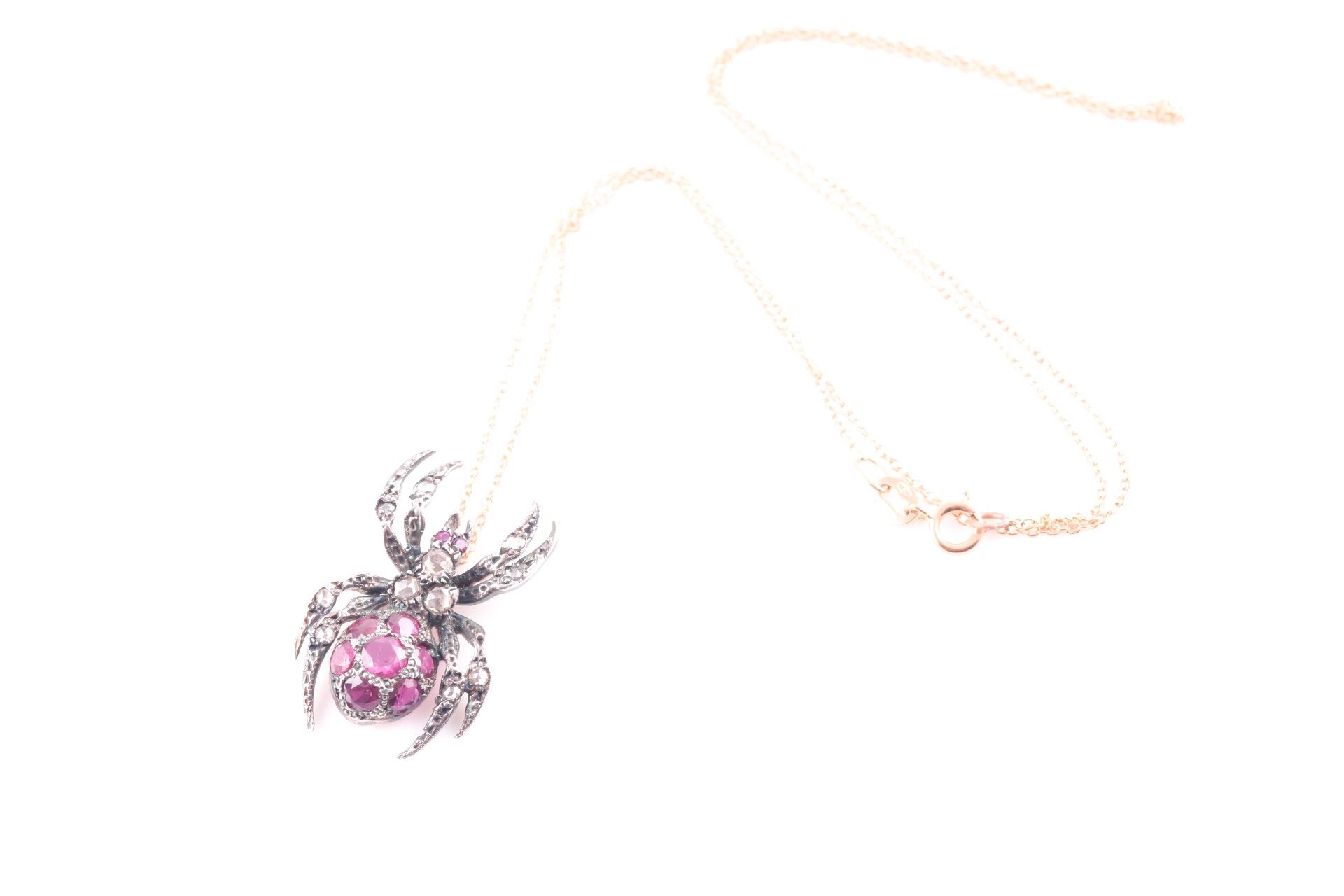 Lot 29 - A silver gilt, diamond, and ruby spider