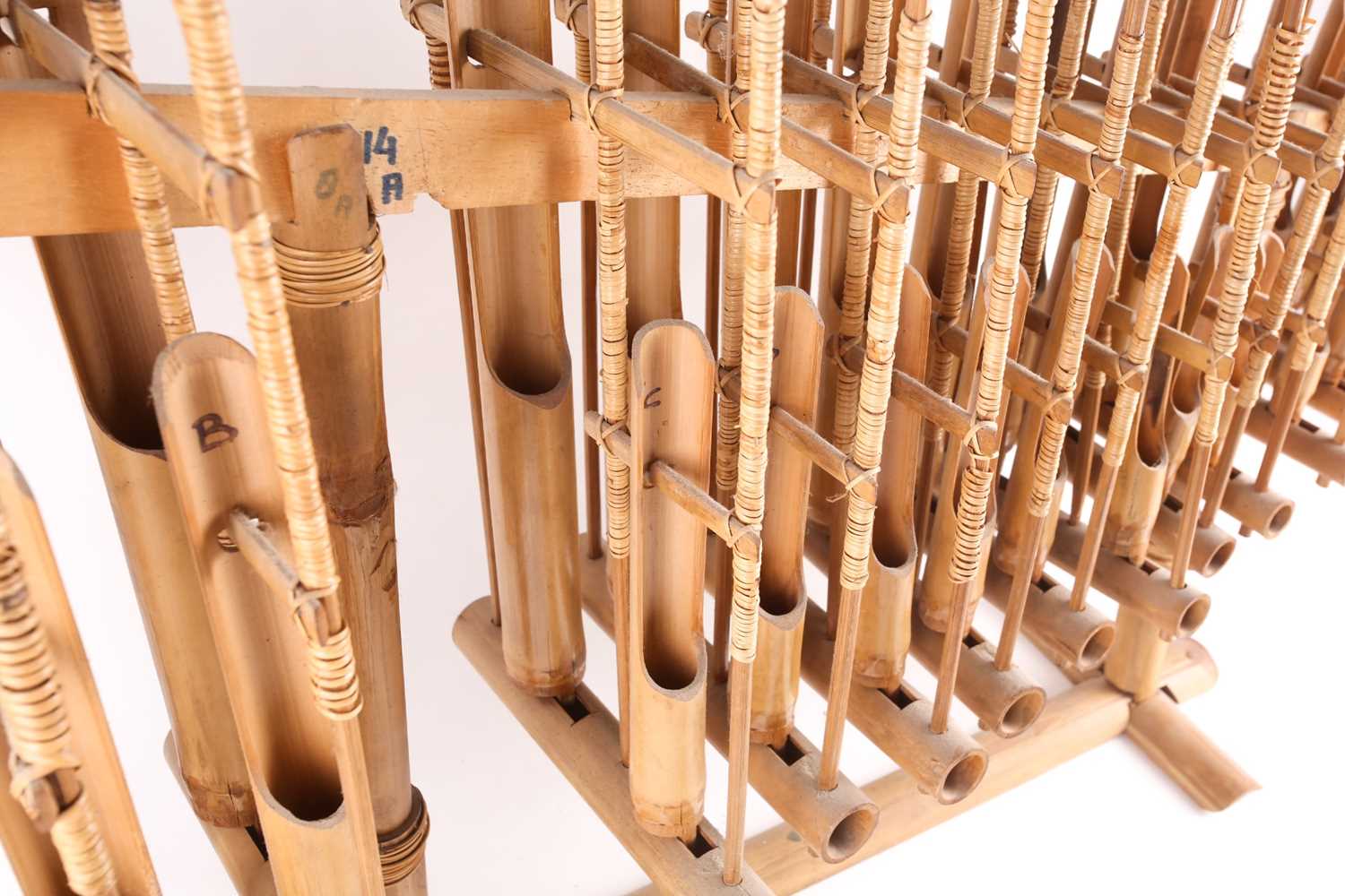 Lot 177 - An Indonesian bamboo 18 note Angklung, two