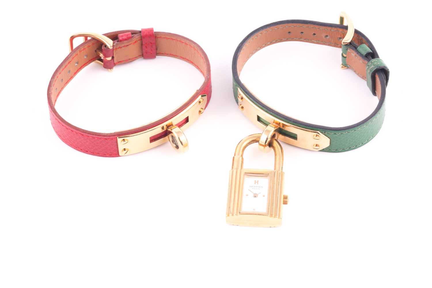 Lot 187 - A Hermes ladies Kelly padlock watch, the two