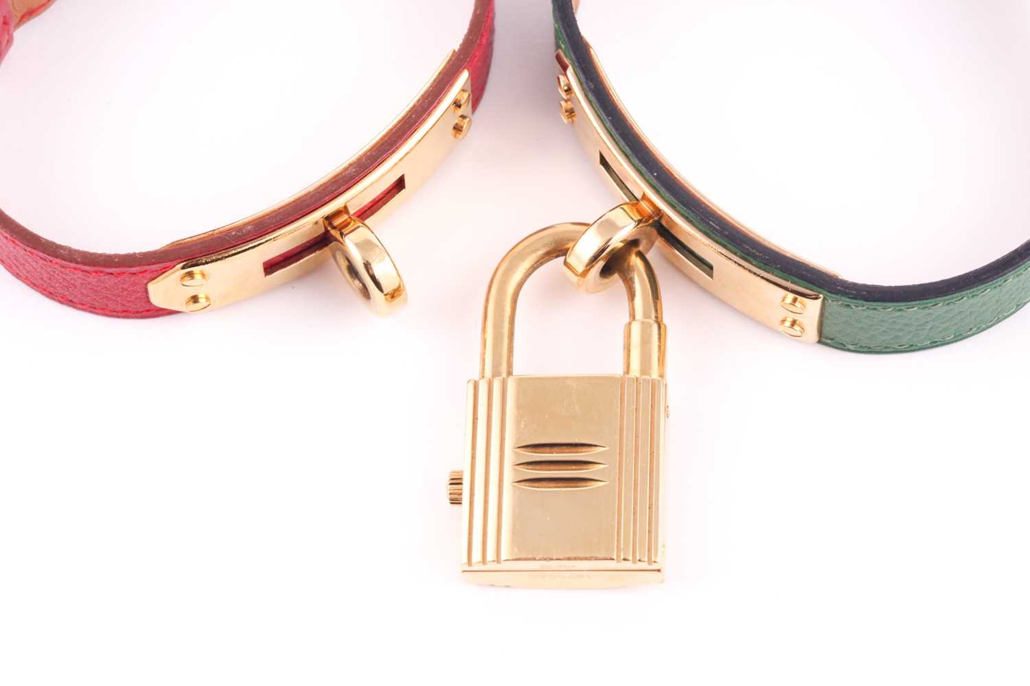 Lot 187 - A Hermes ladies Kelly padlock watch, the two