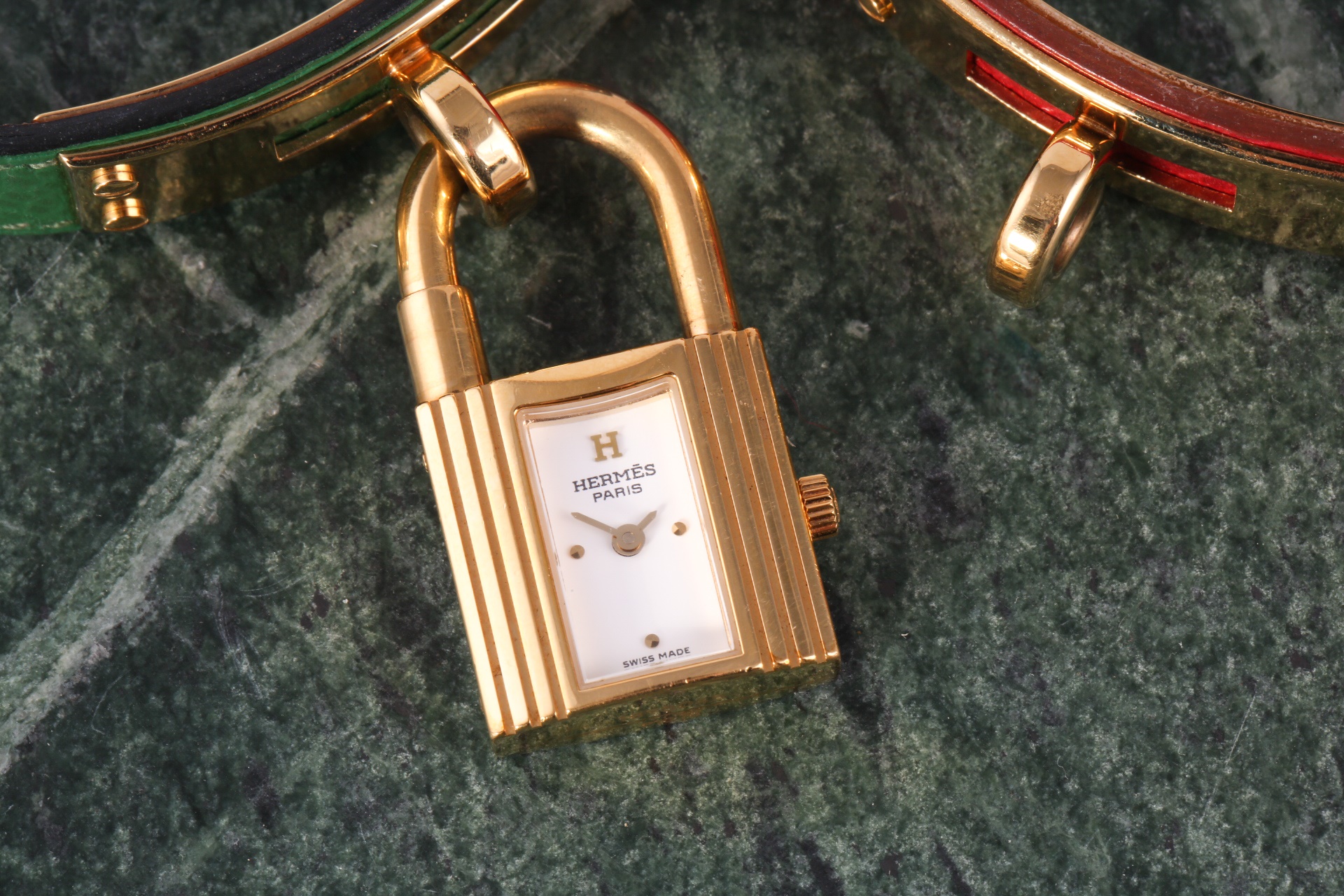 Lot 187 - A Hermes ladies Kelly padlock watch, the two