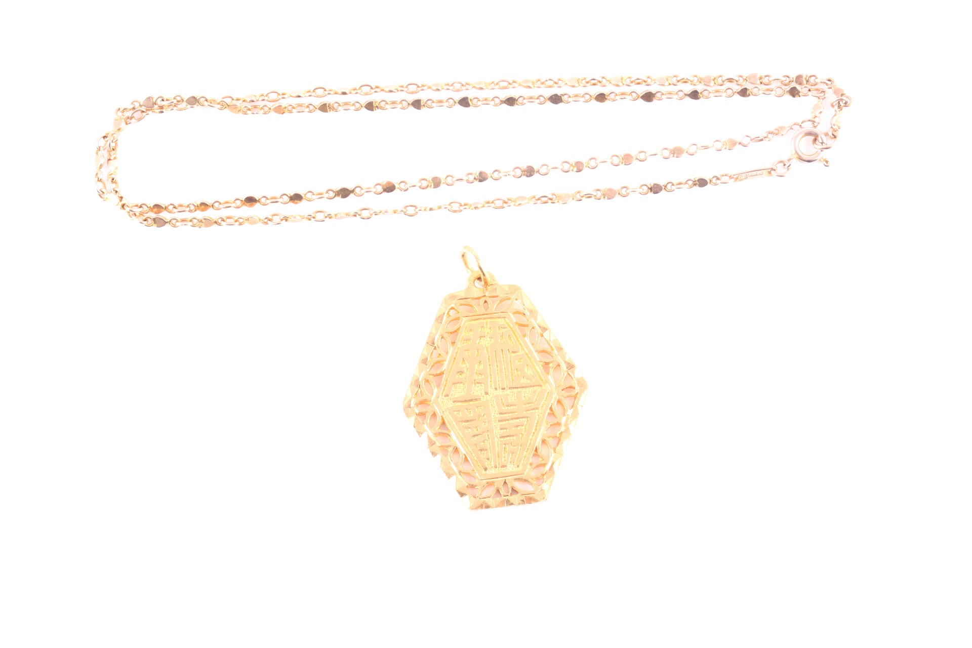 Lot 73 - A Chinese yellow precious metal lozenge shape