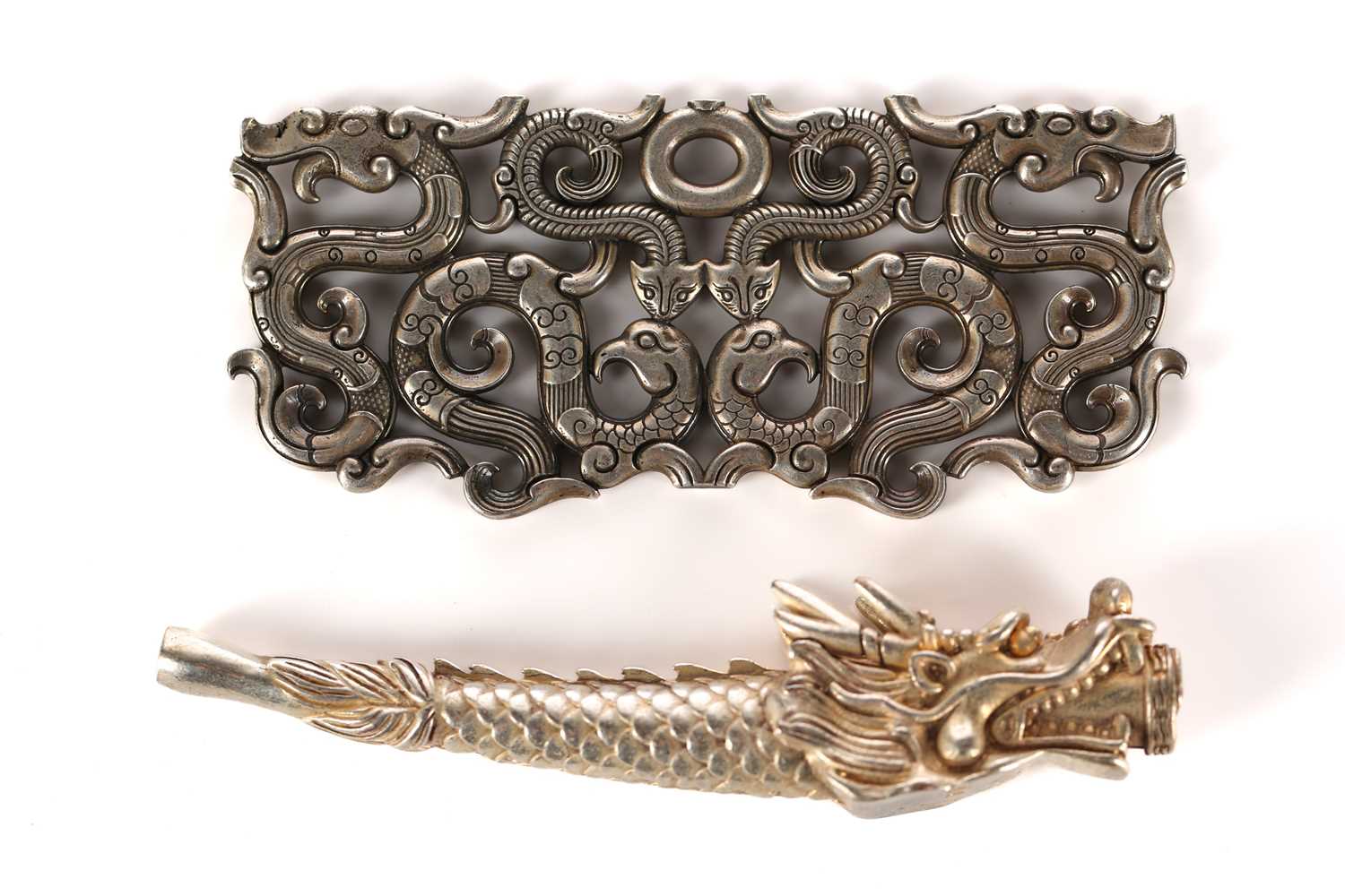 Lot 192 - A Chinese white metal cheroot holder in the