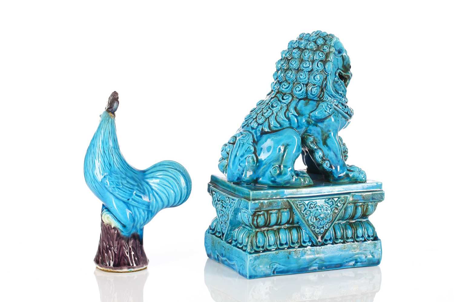 Lot 240 - A Chinese turquoise glazed temple lion, 20th