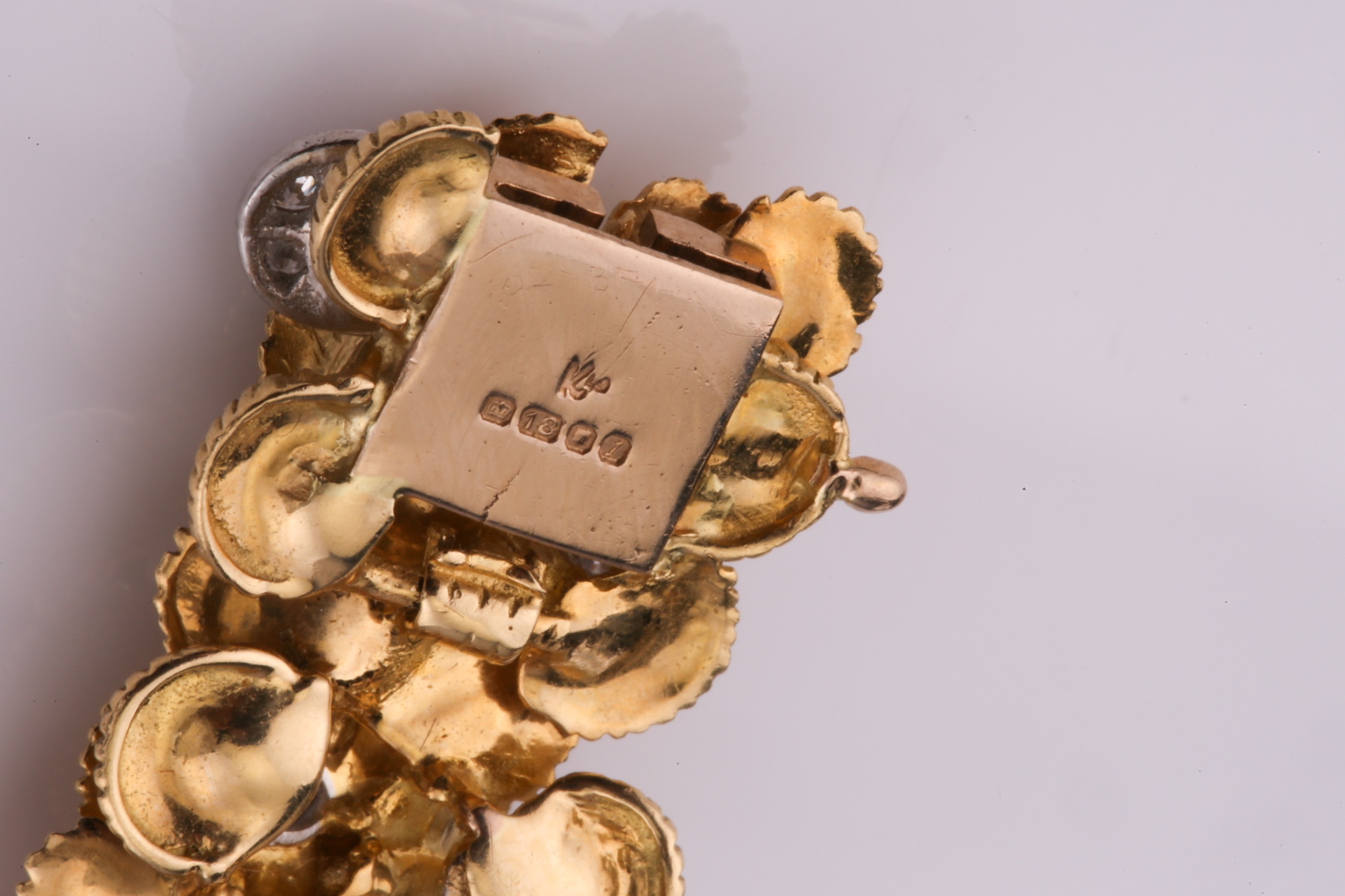 Lot 47 - A Kutchinsky platinum and 18ct yellow gold