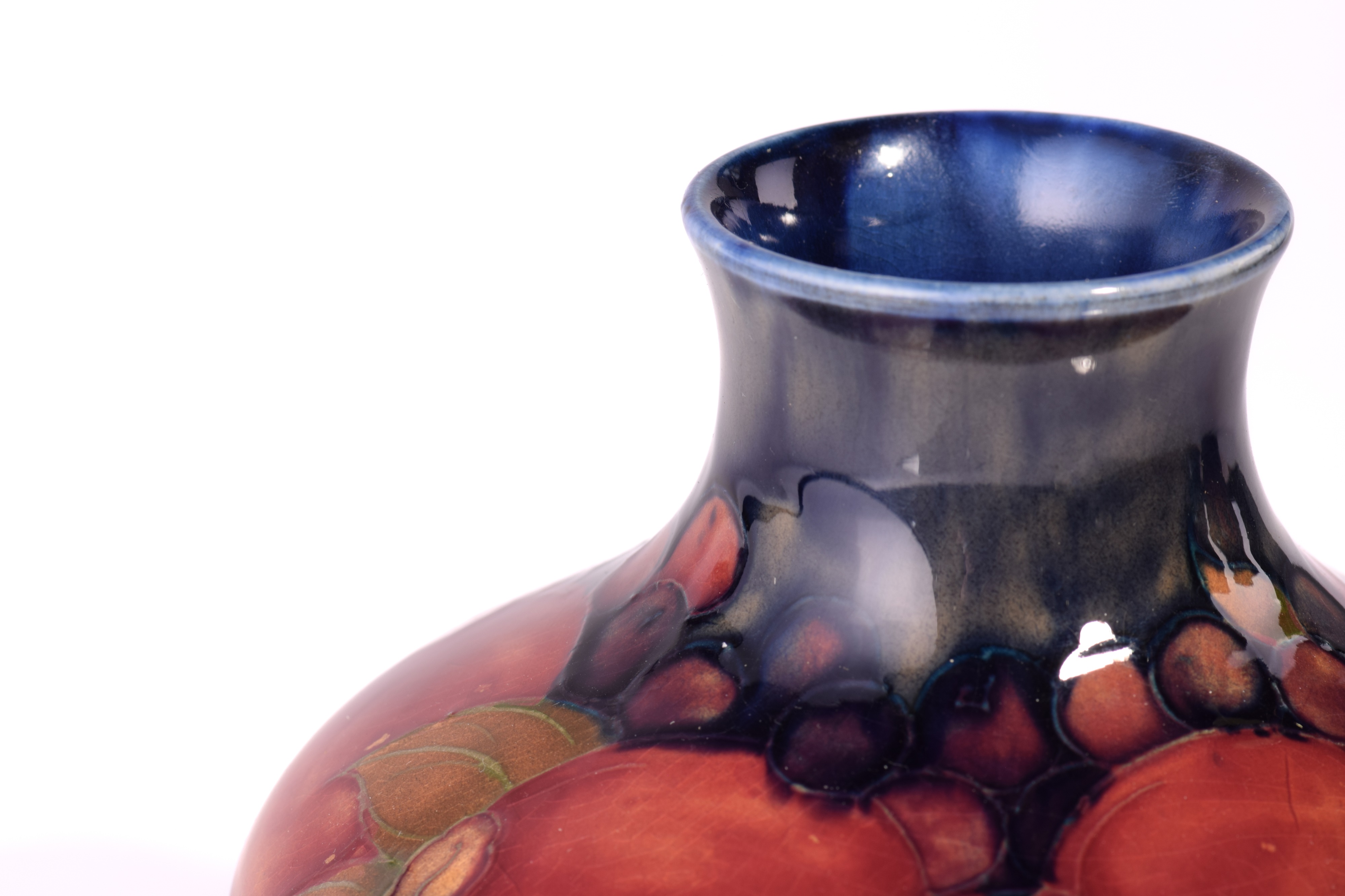 Lot 341 - A Moorcroft red flambe Poppy pattern vase,