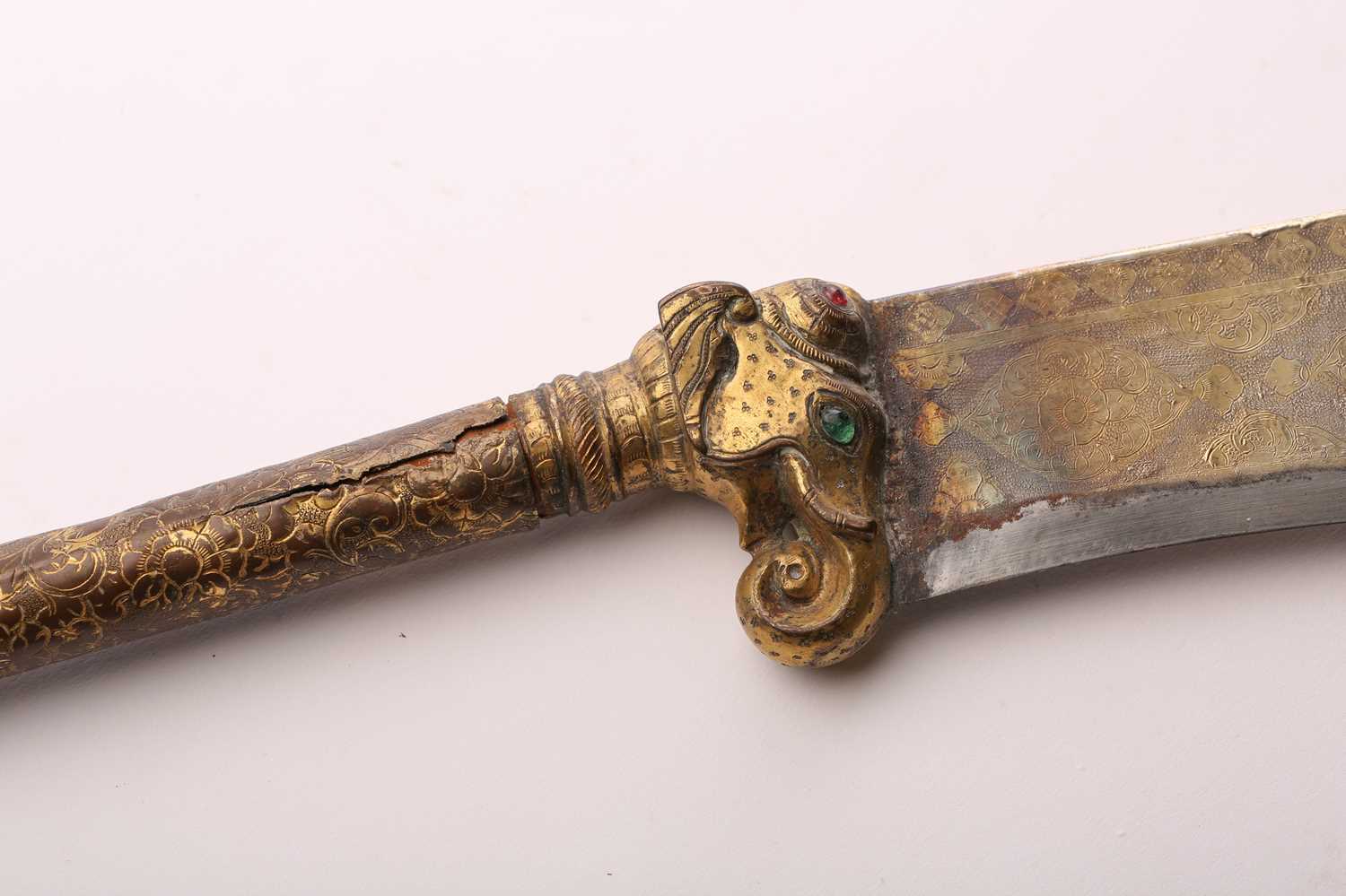 Lot 375 - An Indian Bhuj (elephant axe), India Kutch,