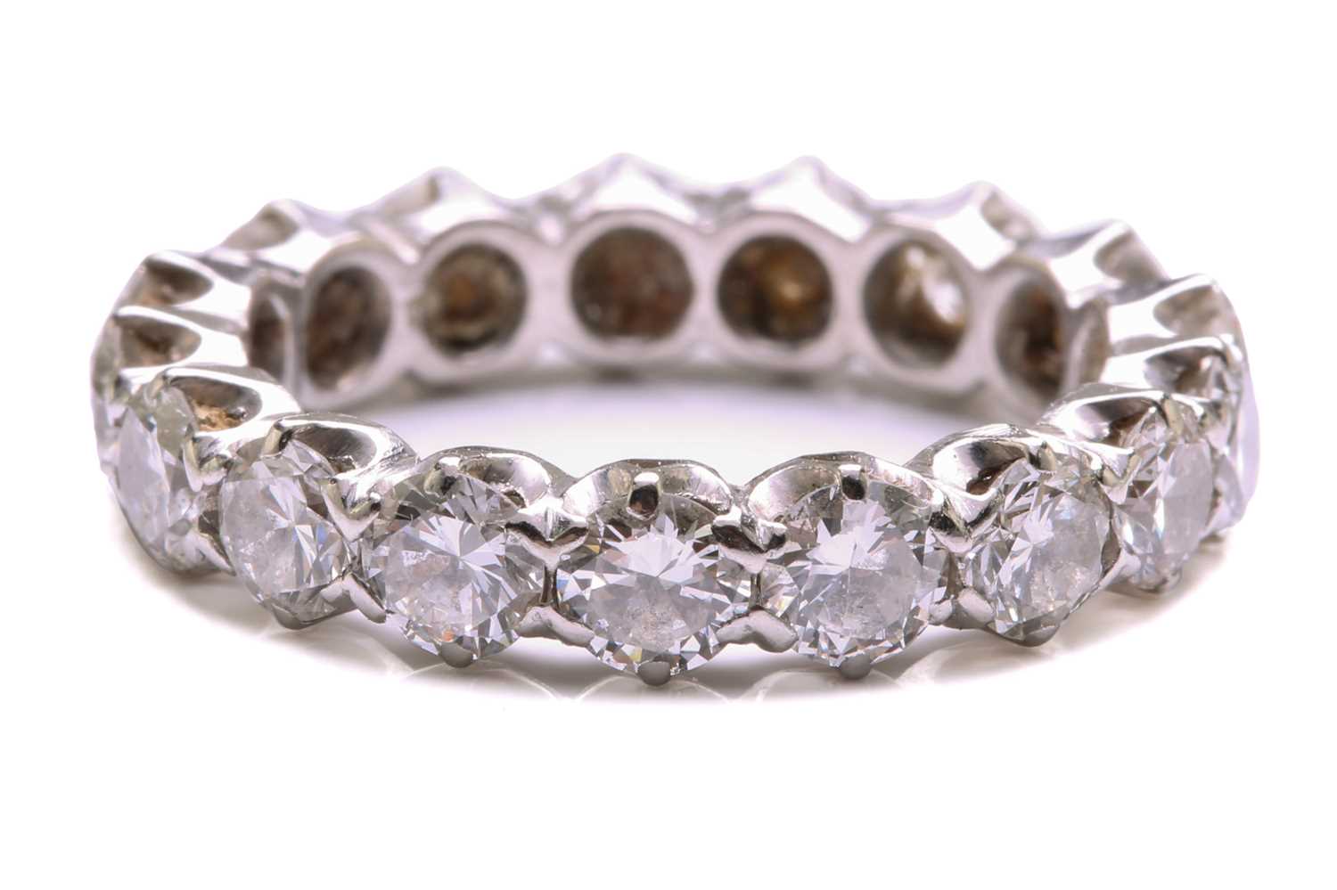 Lot 133 - A diamond eternity ring, featuring seventeen