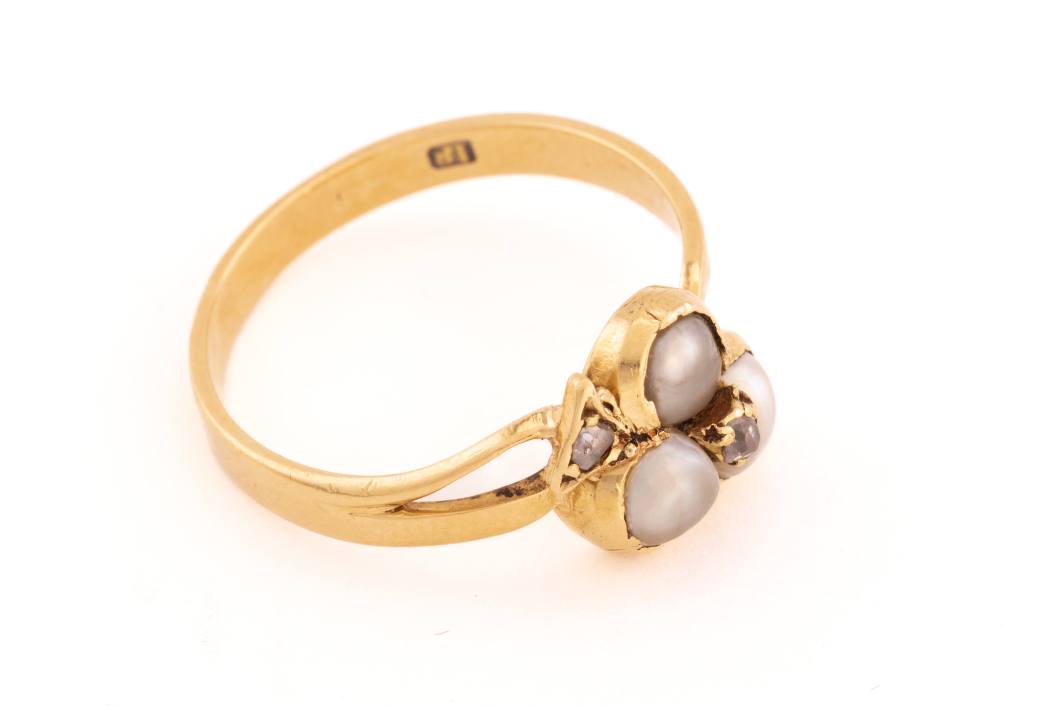 Lot 69 - A pearl and diamond three-leaf clover ring,