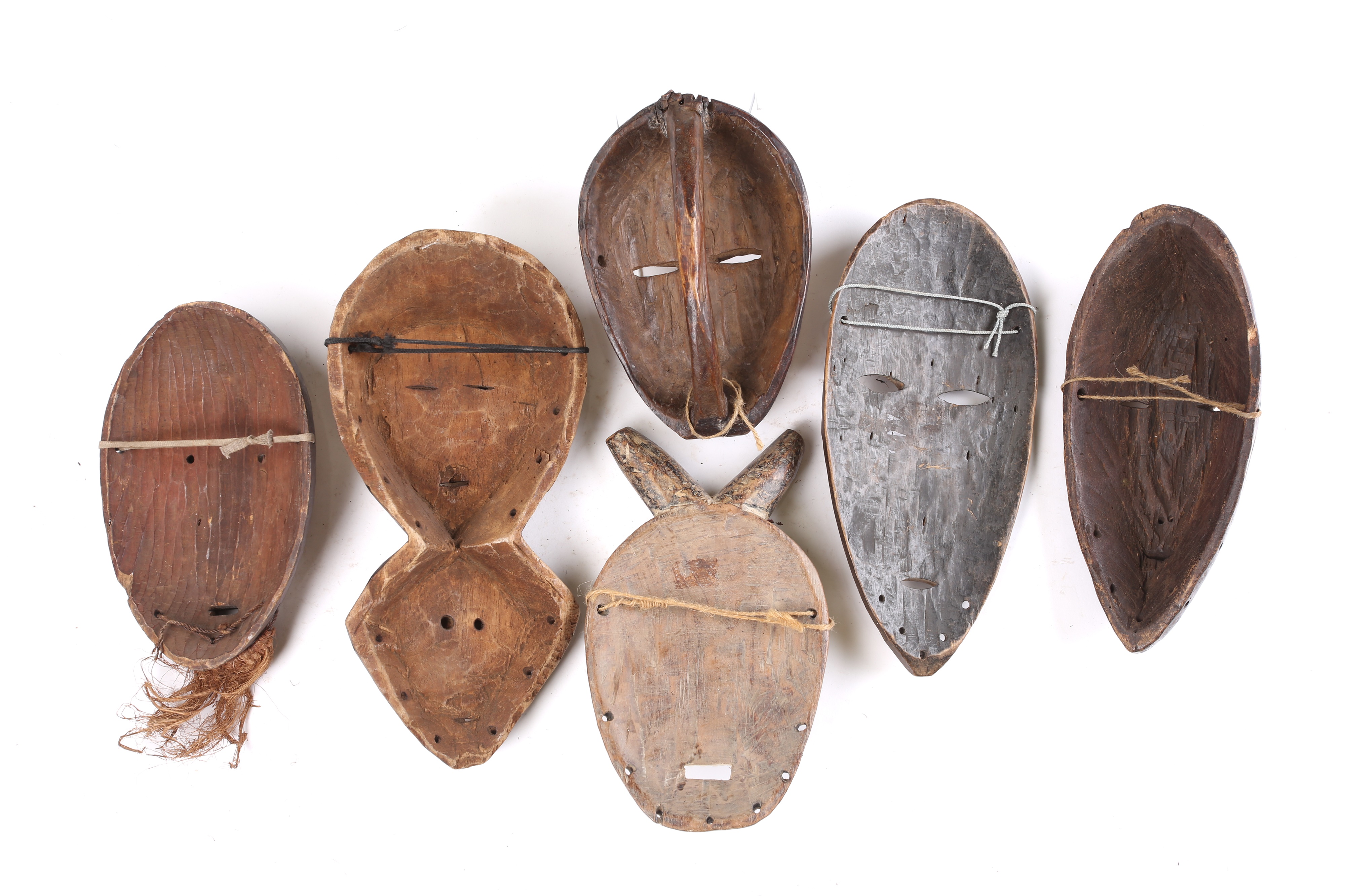 Lot 24 - A hand held Lega mask, Lukwakongo, the face