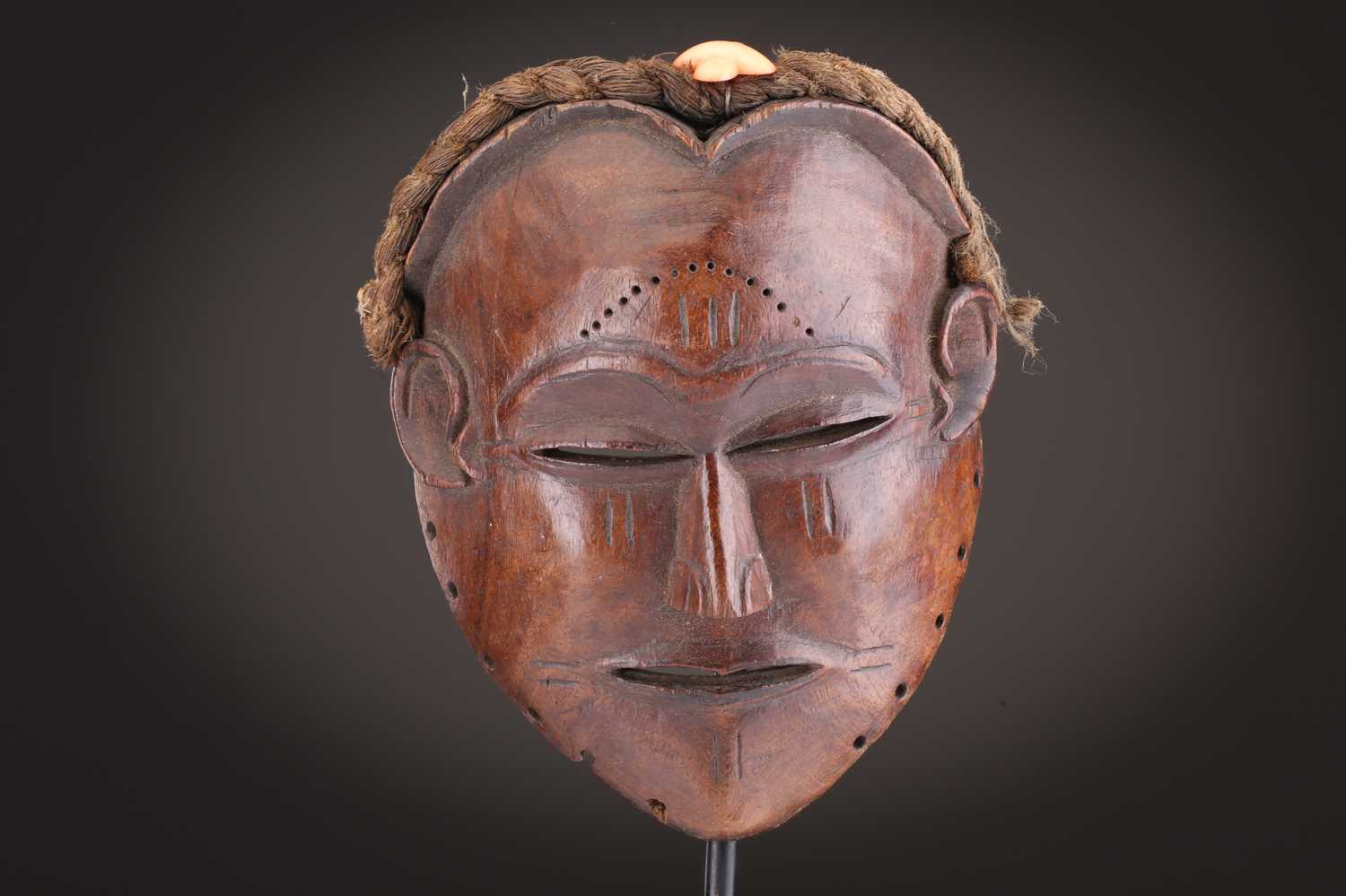 Lot 8 - A Mbunda Sachihongo mask, Angola, the forehead