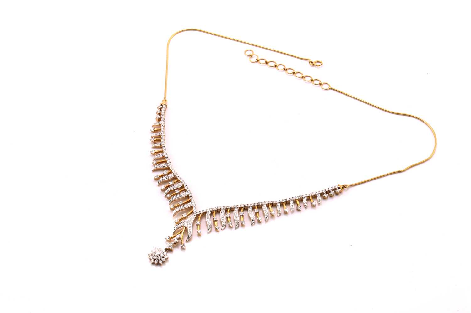Lot 95 - A diamond V-shaped fringe necklace,