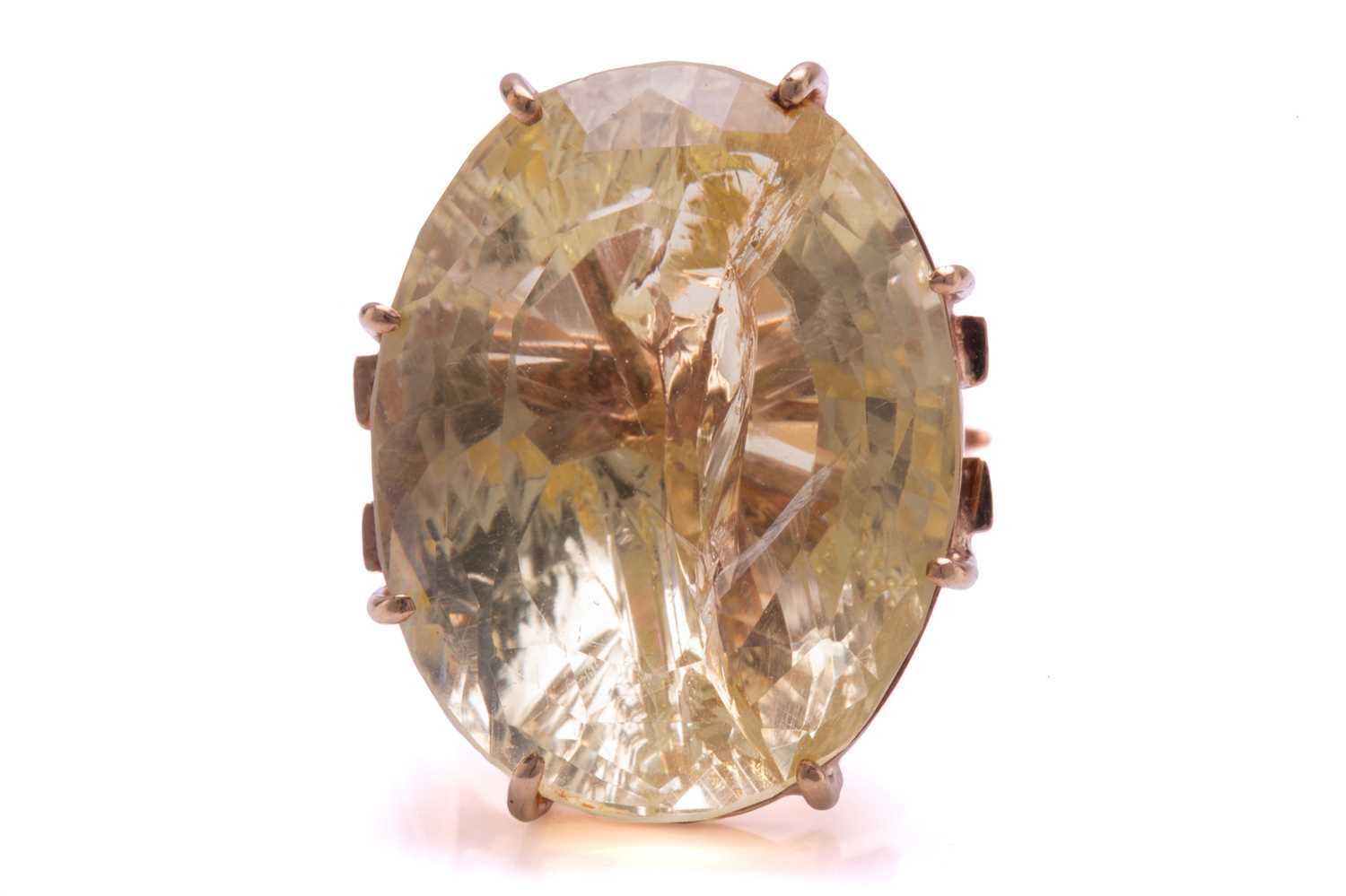 Lot 238 - A large citrine ring, featuring an oval