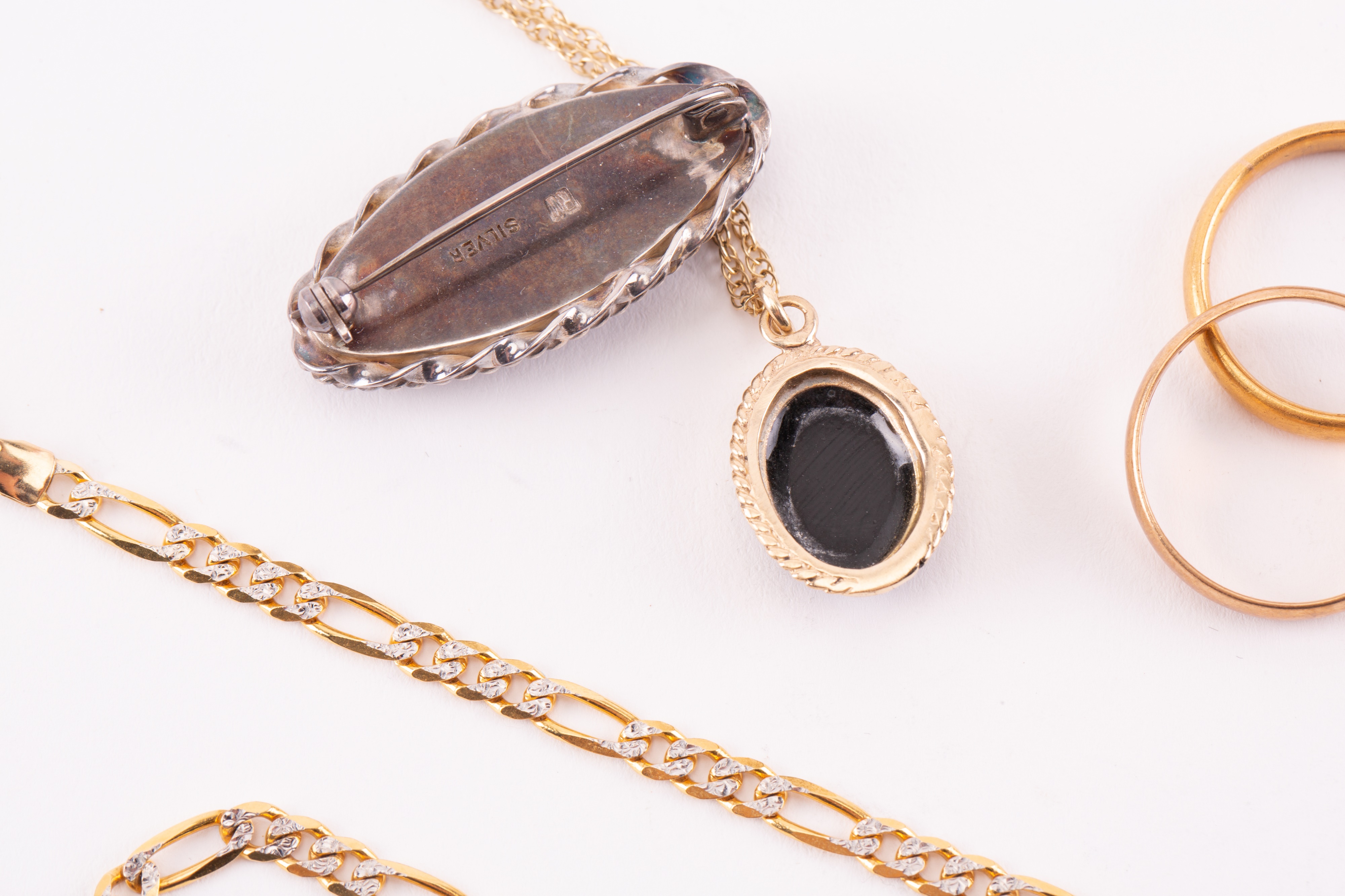 Lot 129 - Two gold wedding bands, jewellery items set