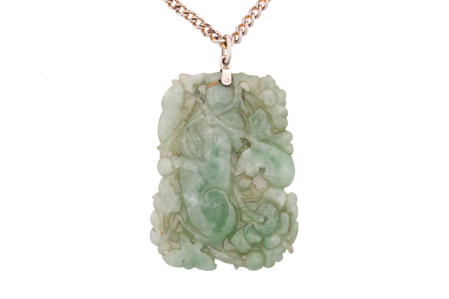 Lot 198 - A carved jade pendant, in rectangular form,