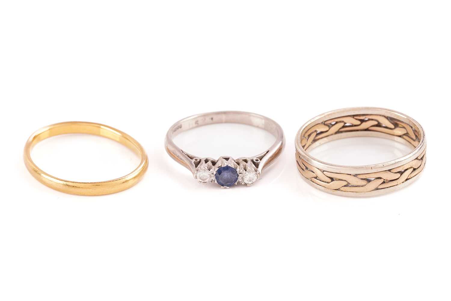 Lot 133 - Three gold rings; including a 22ct yellow