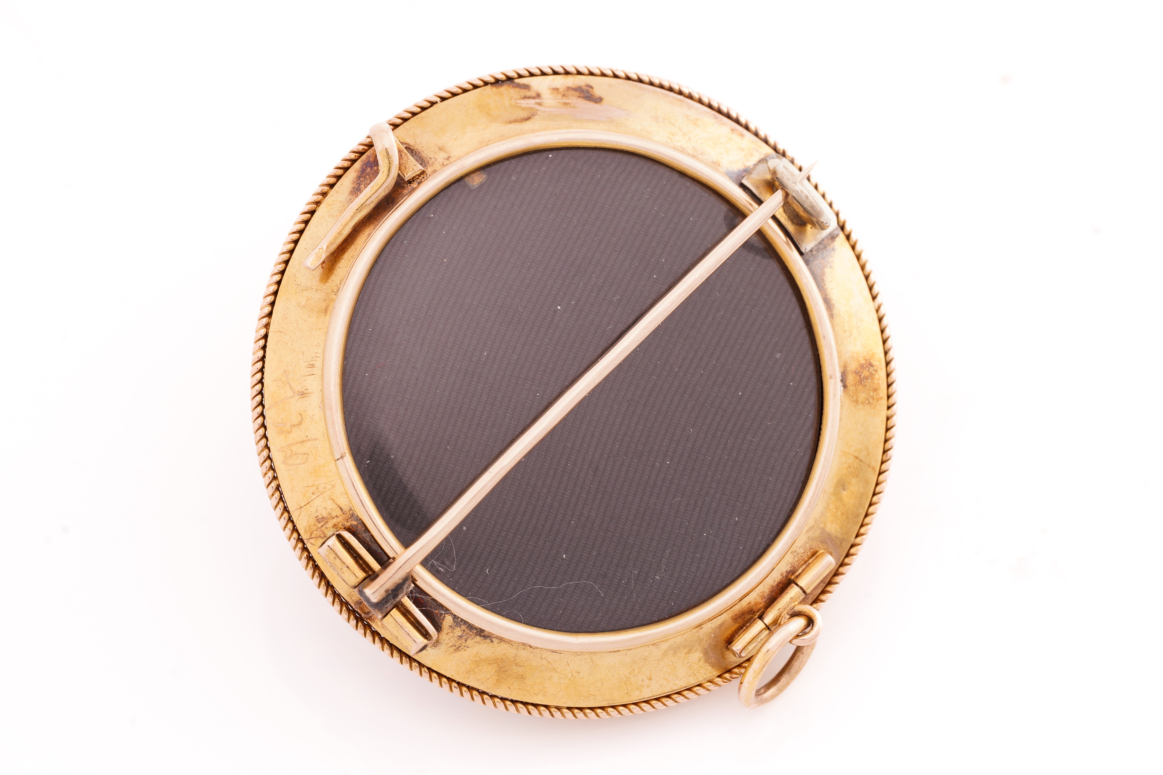 Lot 337 - A Victorian mourning brooch, of domed