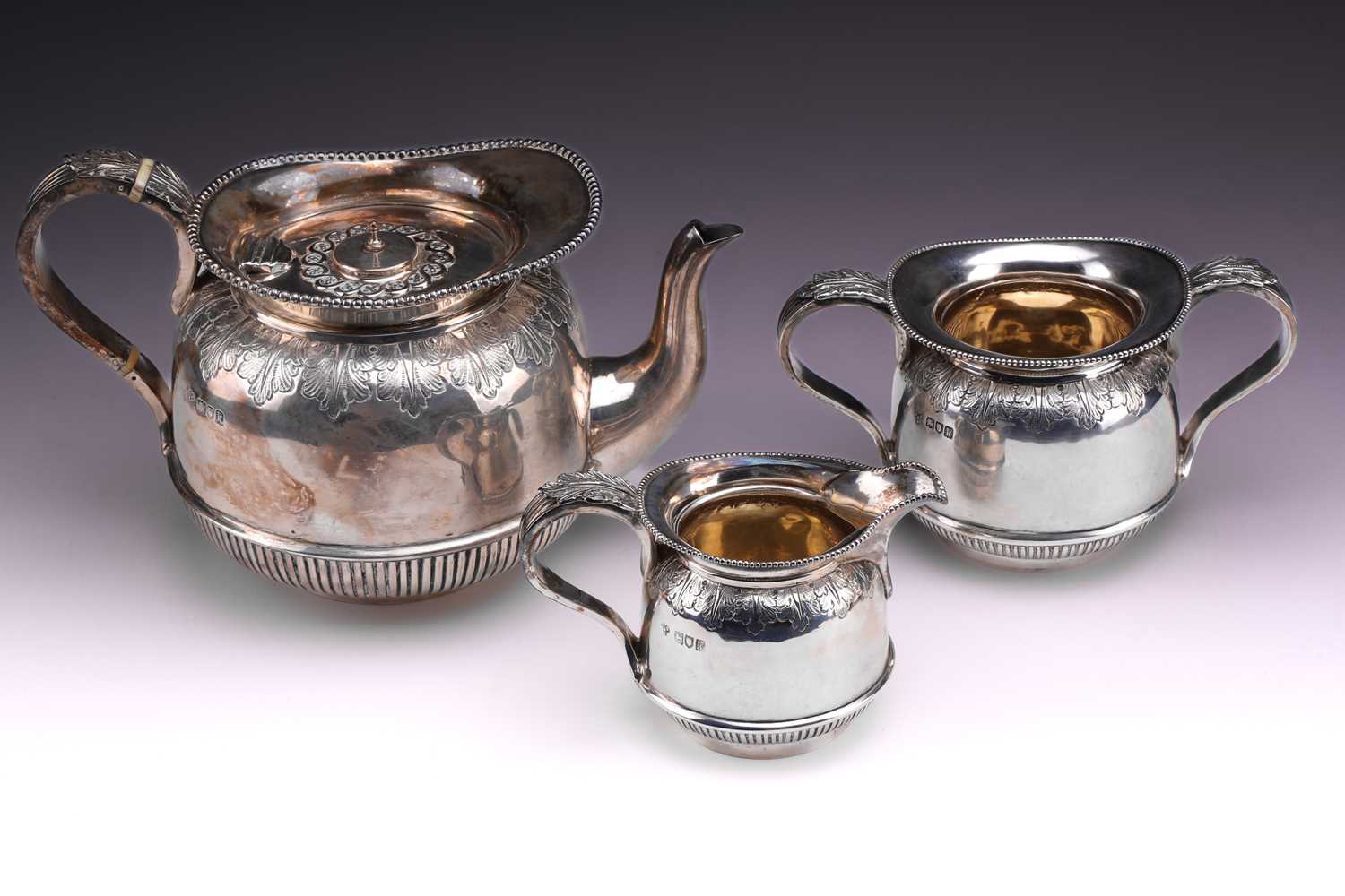Lot 370 - An Edwardian three piece silver tea set;