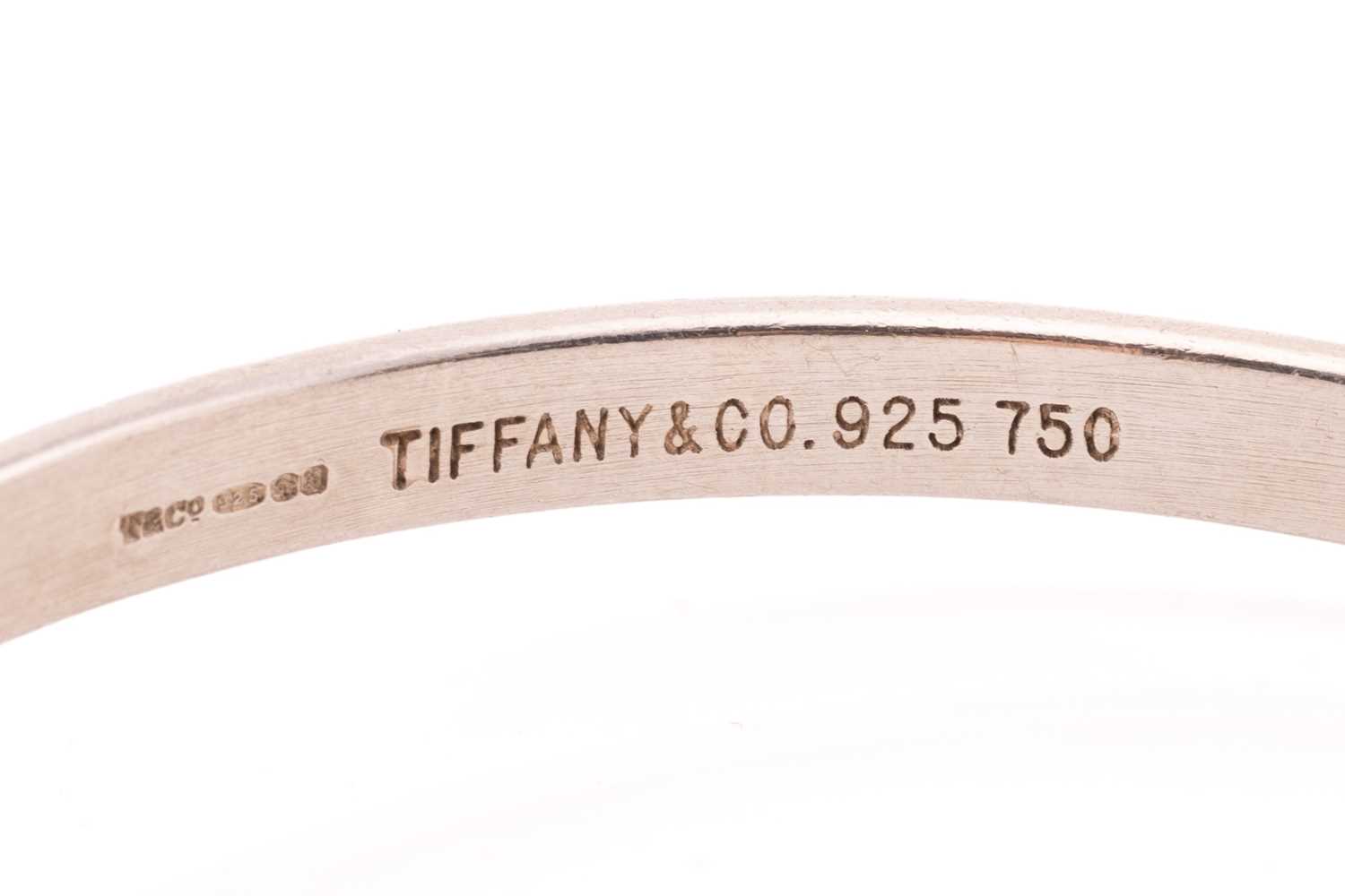 Lot 130 - Tiffany & Co. - A two-tone hook and eye