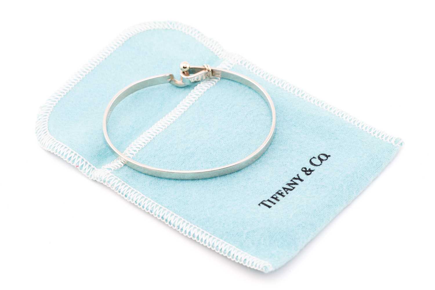 Lot 130 - Tiffany & Co. - A two-tone hook and eye