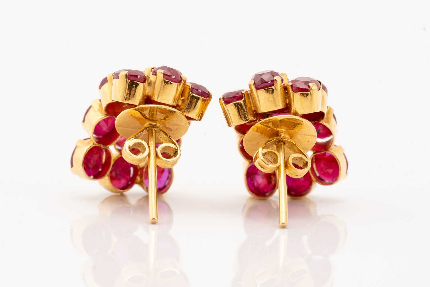 Lot 111 - A pair of ruby cluster earrings, each