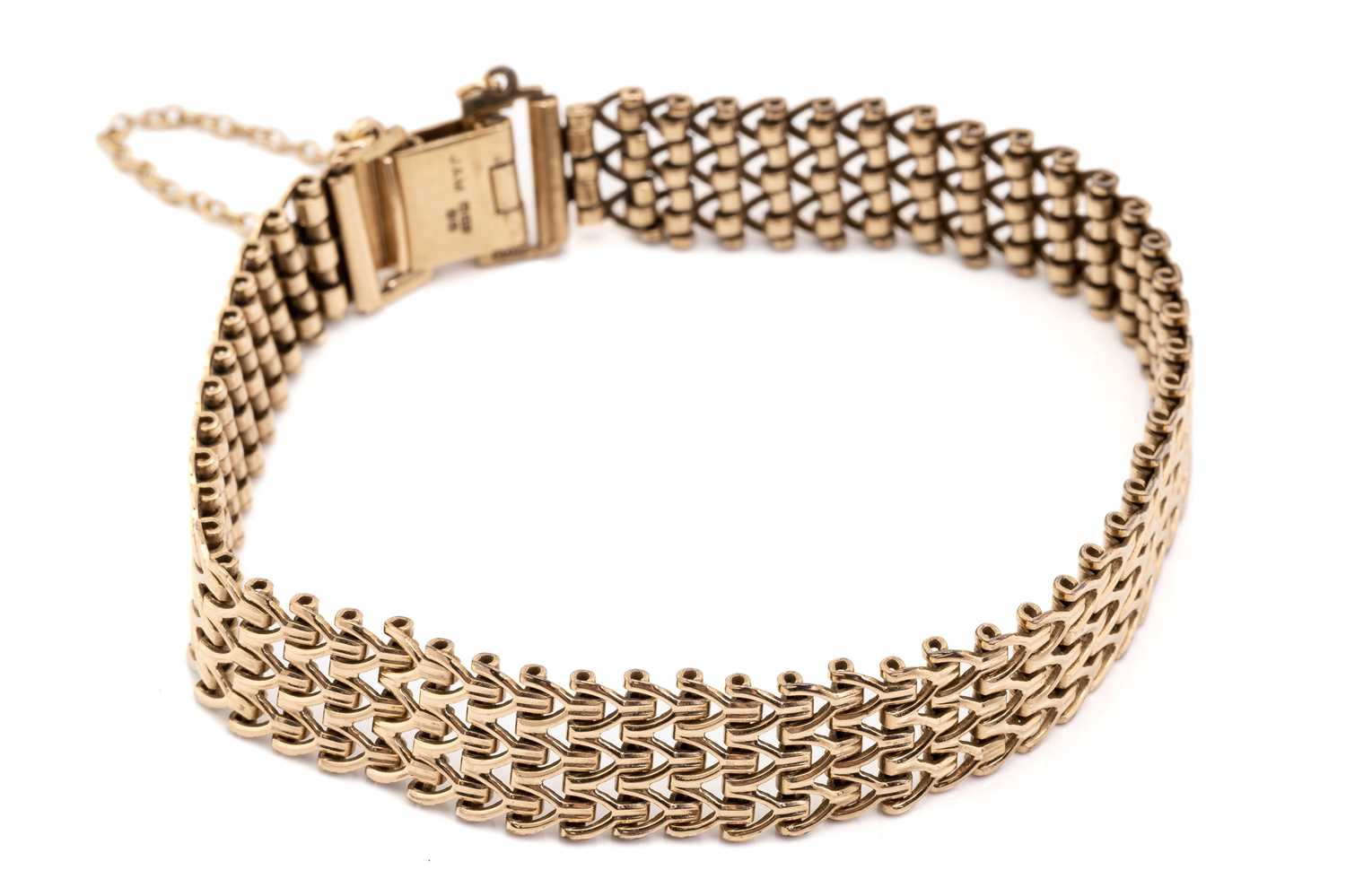 Lot 245 - A 9ct yellow gold flat mesh link bracelet