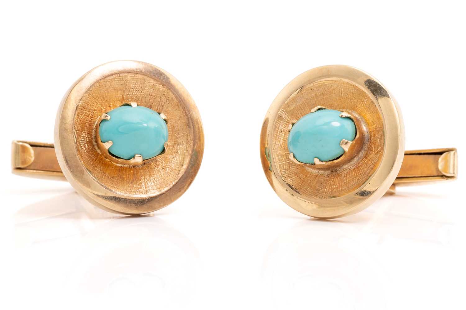 Lot 76 - A pair of turquoise-set cufflinks, each