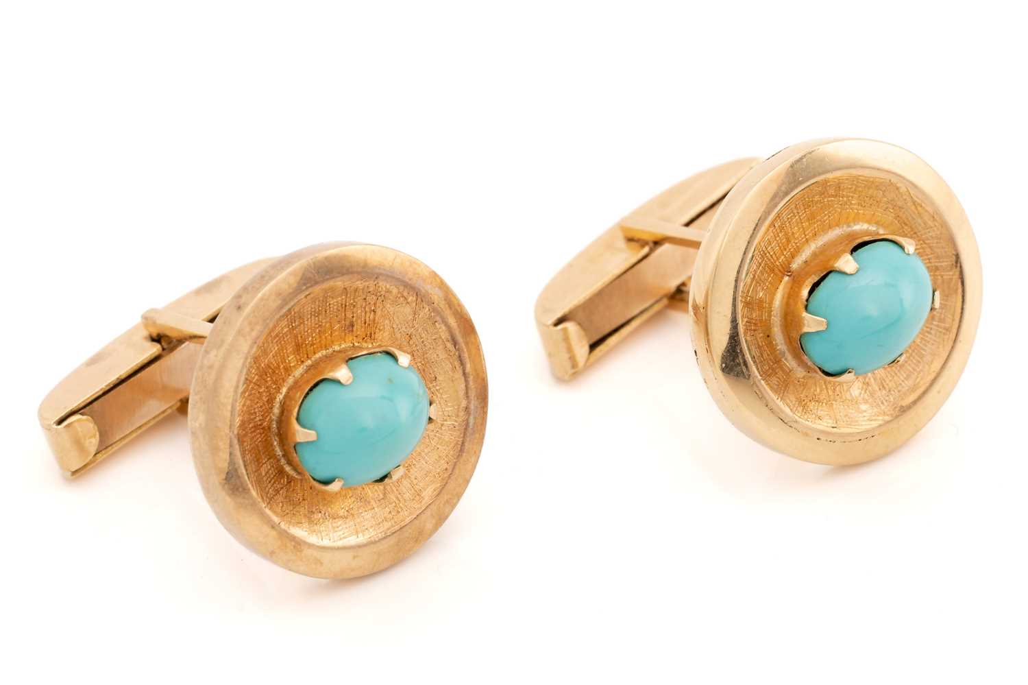 Lot 76 - A pair of turquoise-set cufflinks, each