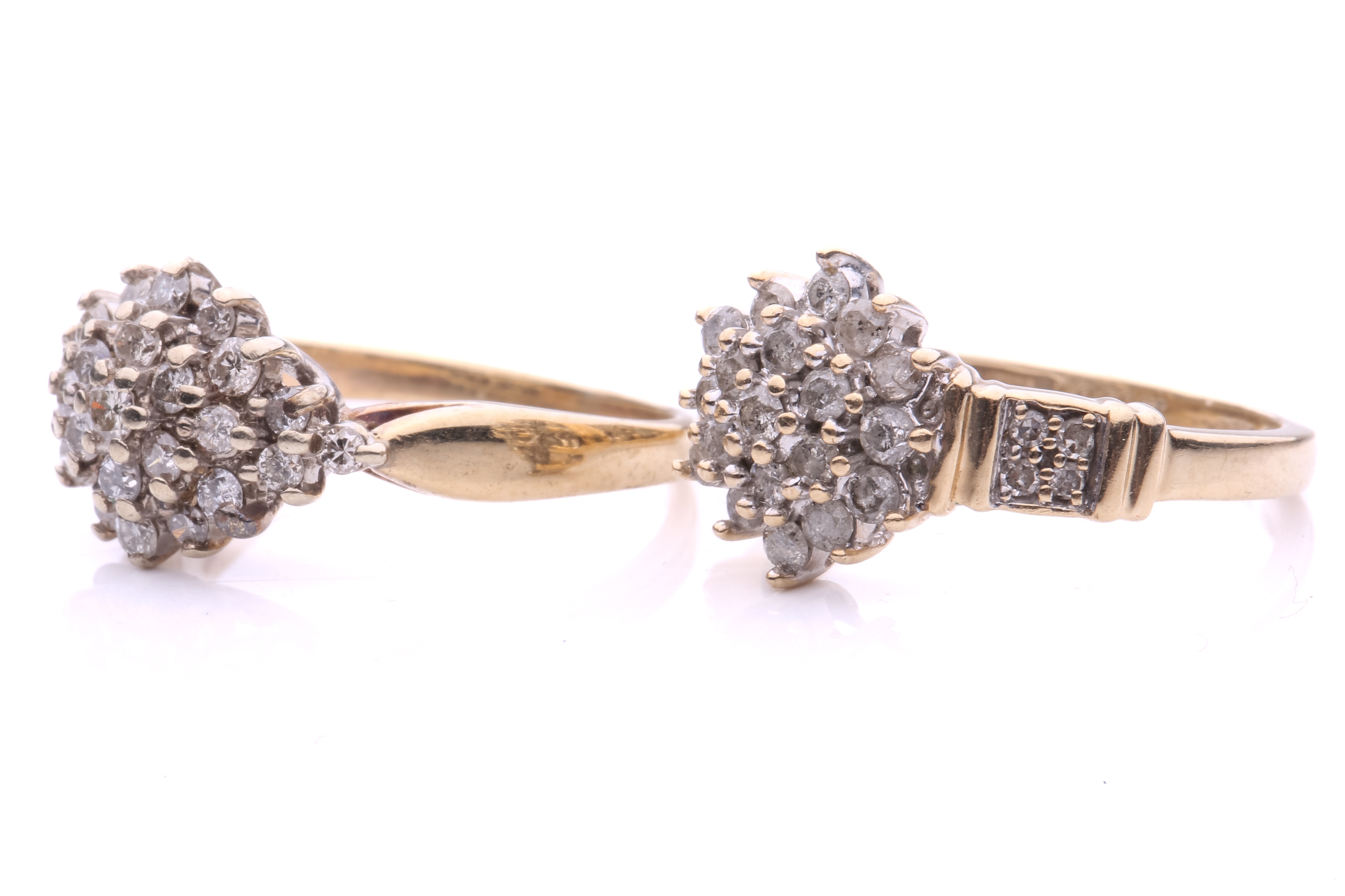 Lot 72 - Two diamond cluster rings in 9ct gold; the