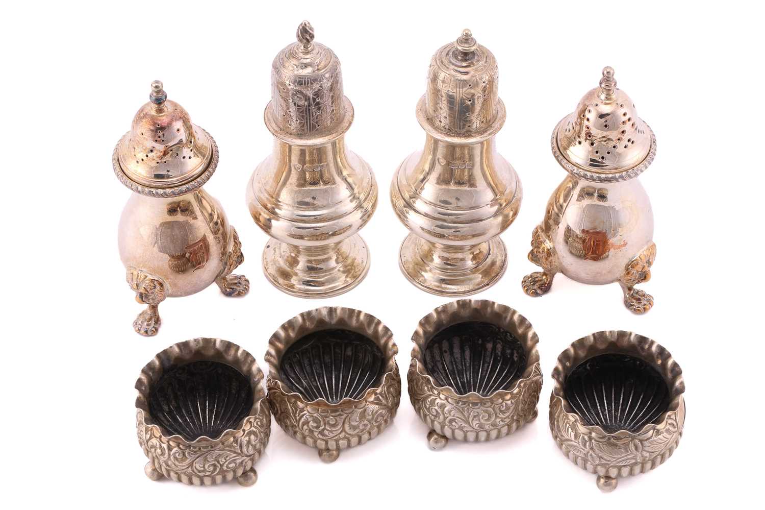 Lot 420 - A pair of silver pepperettes, London 1905 by