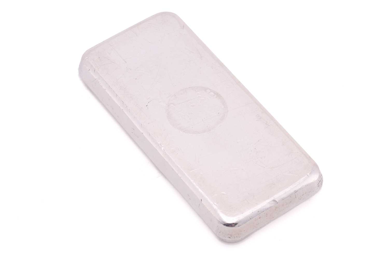 Lot 431 - A 1 kilo silver bullion bar. The rounded