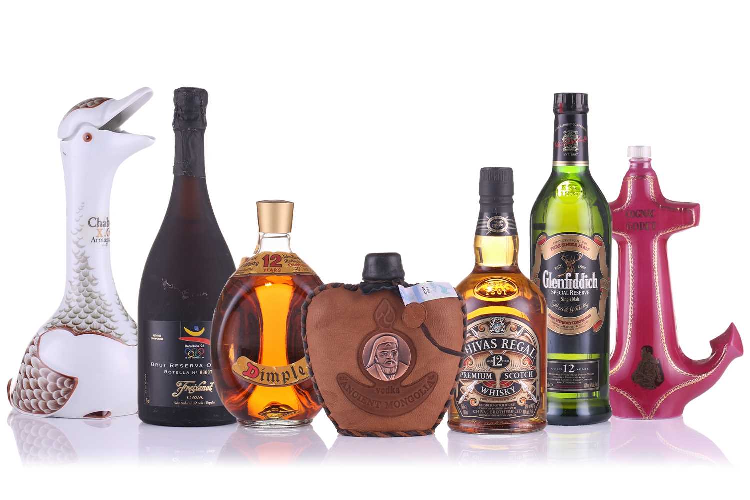 Lot 13 - Seven bottles of boxed spirits, comprising a