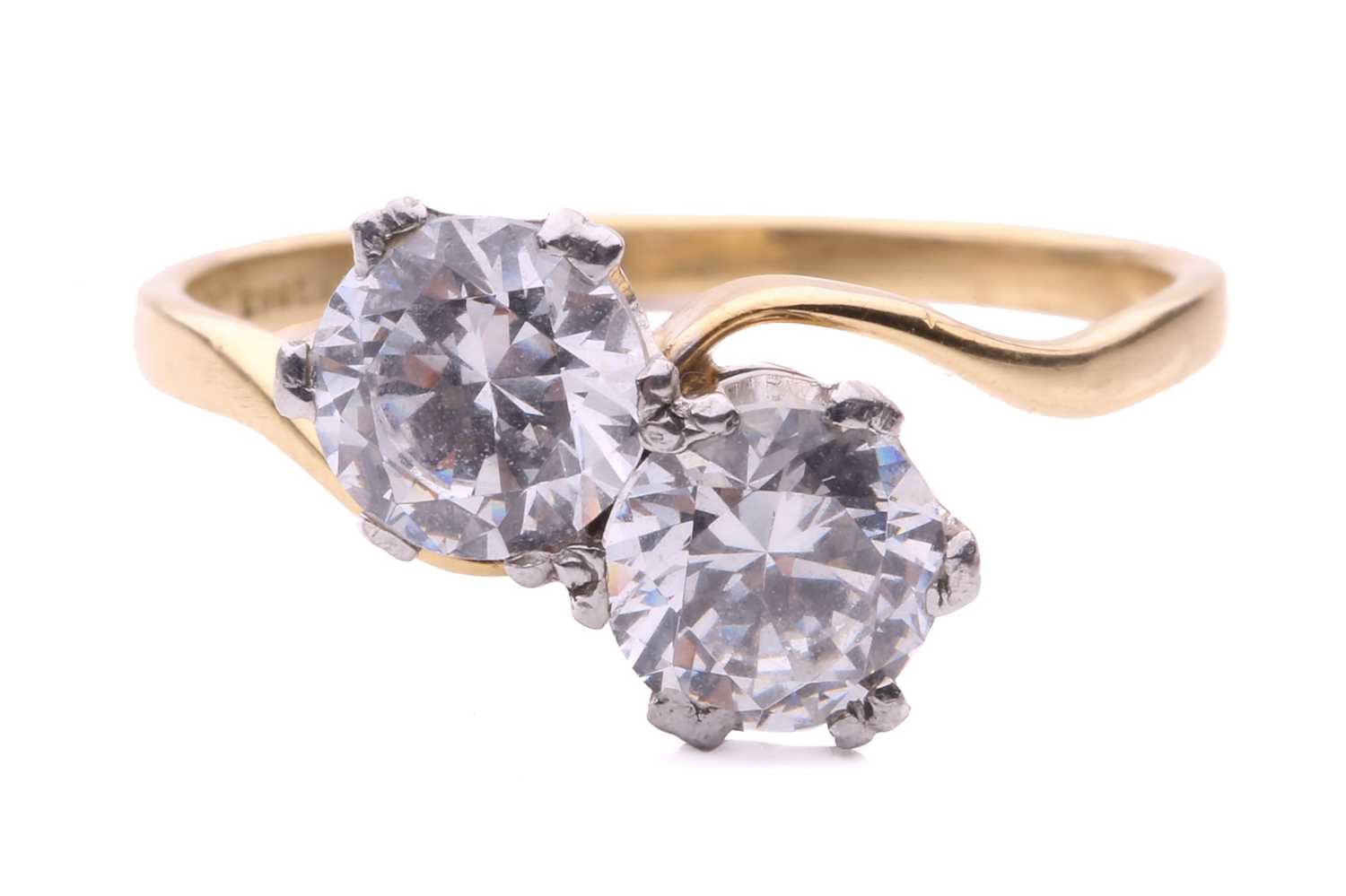 Lot 184 - A two stone cross over ring set with cubic