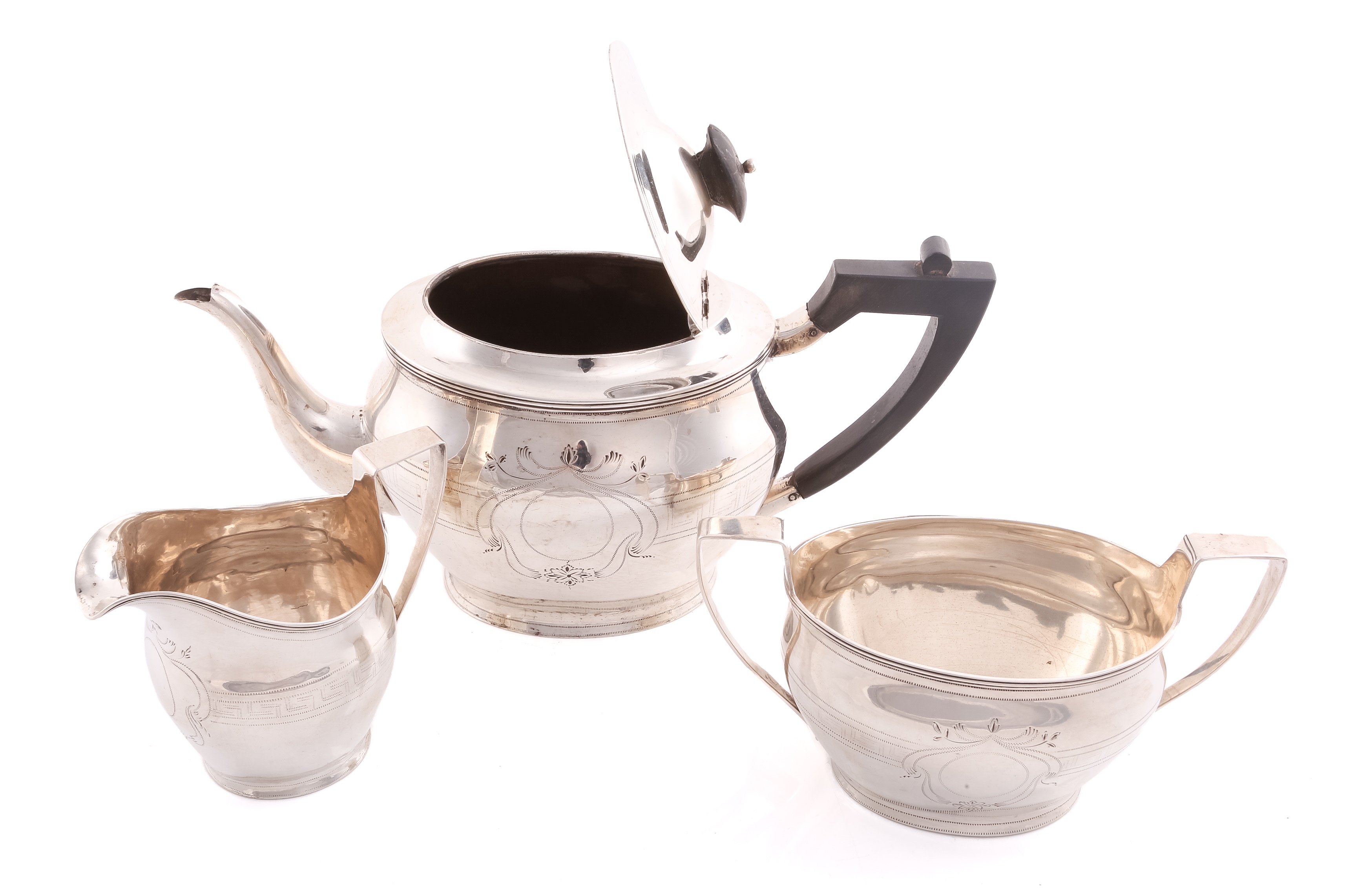 Lot 411 - An Edward VII three-piece silver tea set,