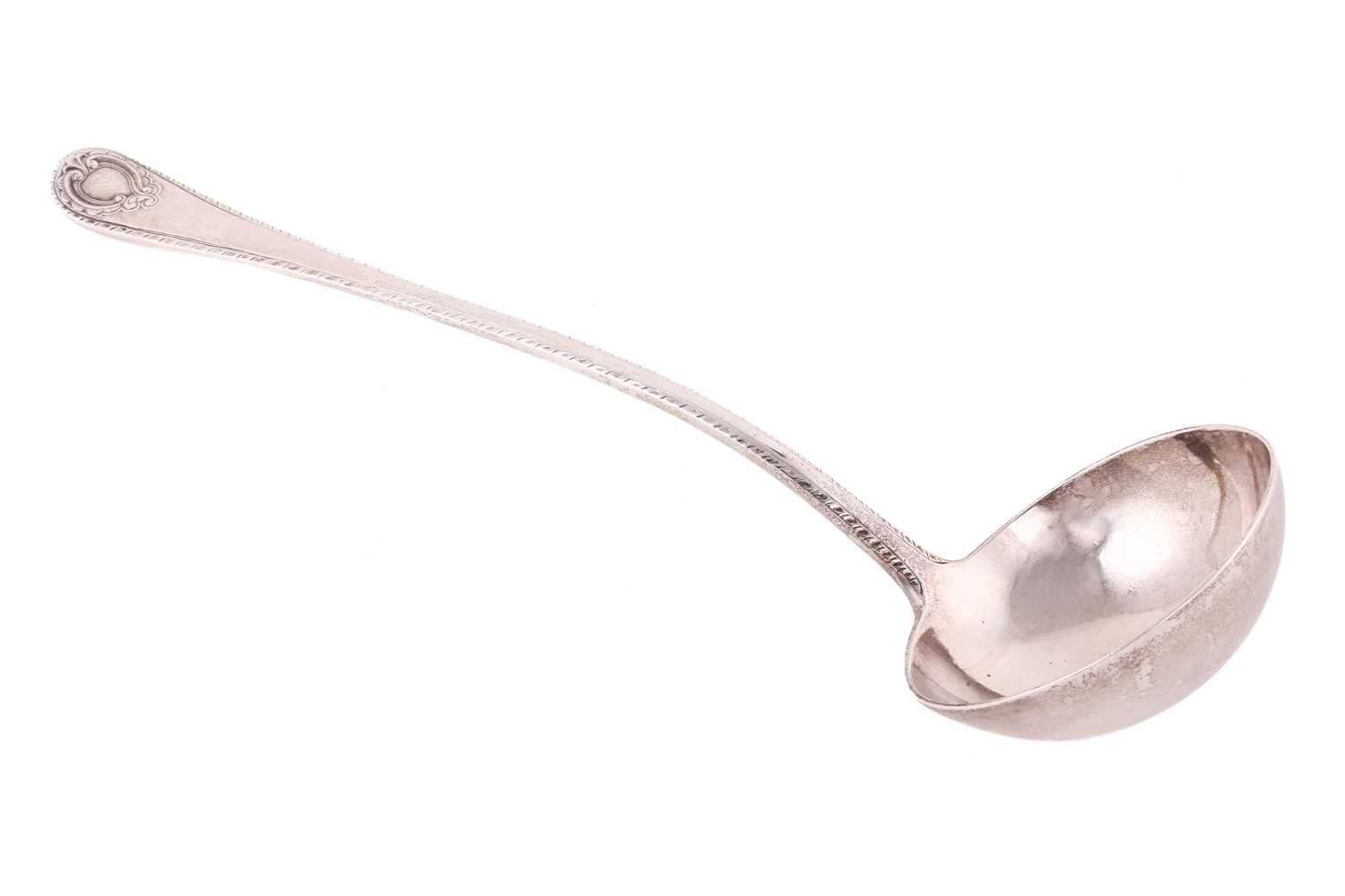 Lot 473 - A Victorian silver soup ladle, John Bodman