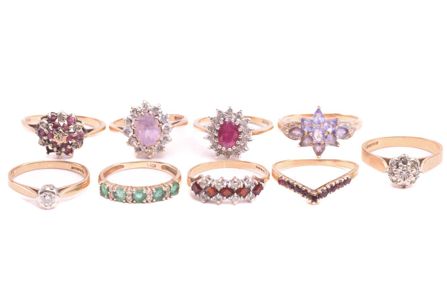 Lot 79 - A collection of nine gem-set rings, including