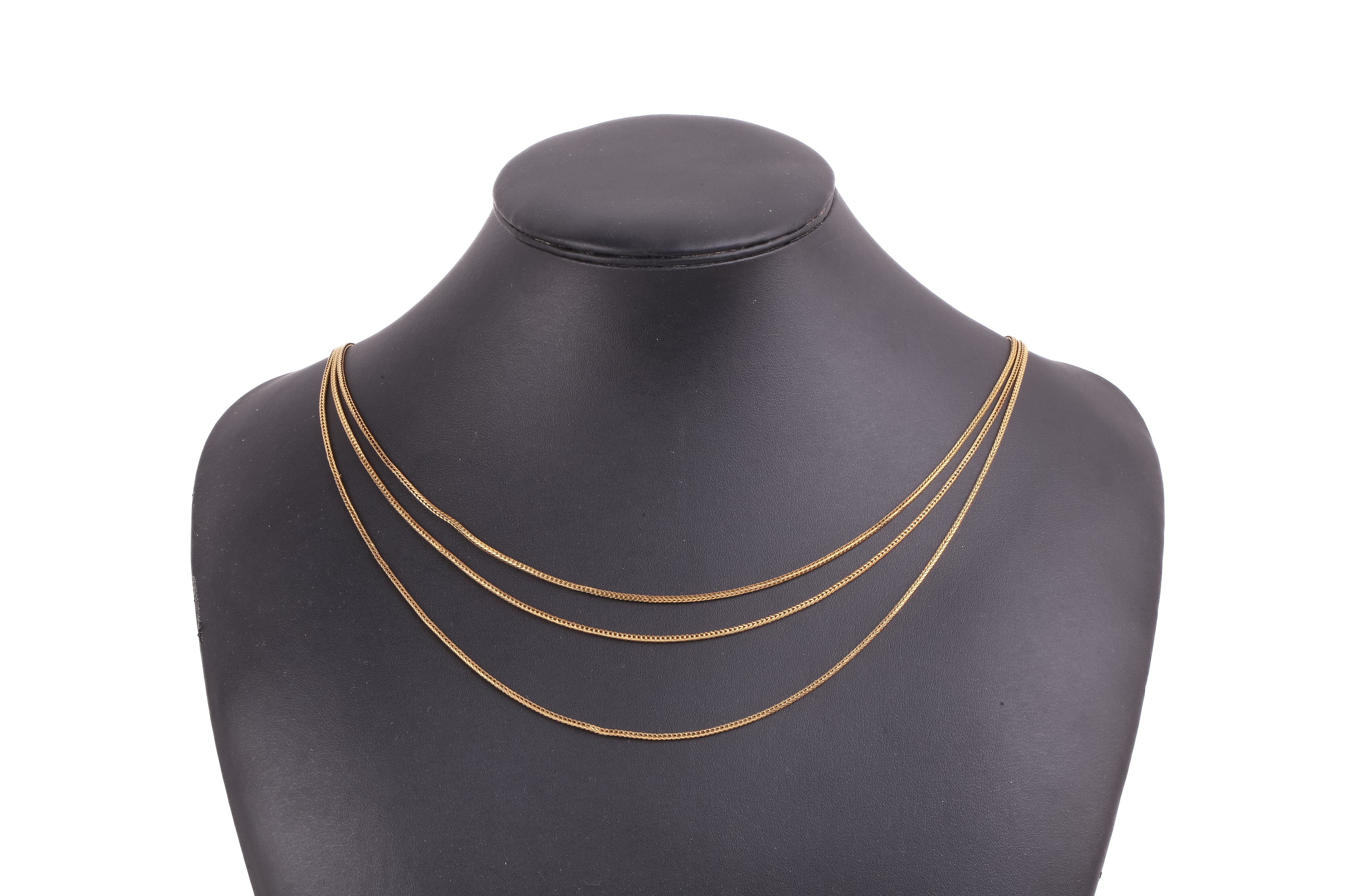 Lot 300 - A three-strand chain necklace, the foxtail