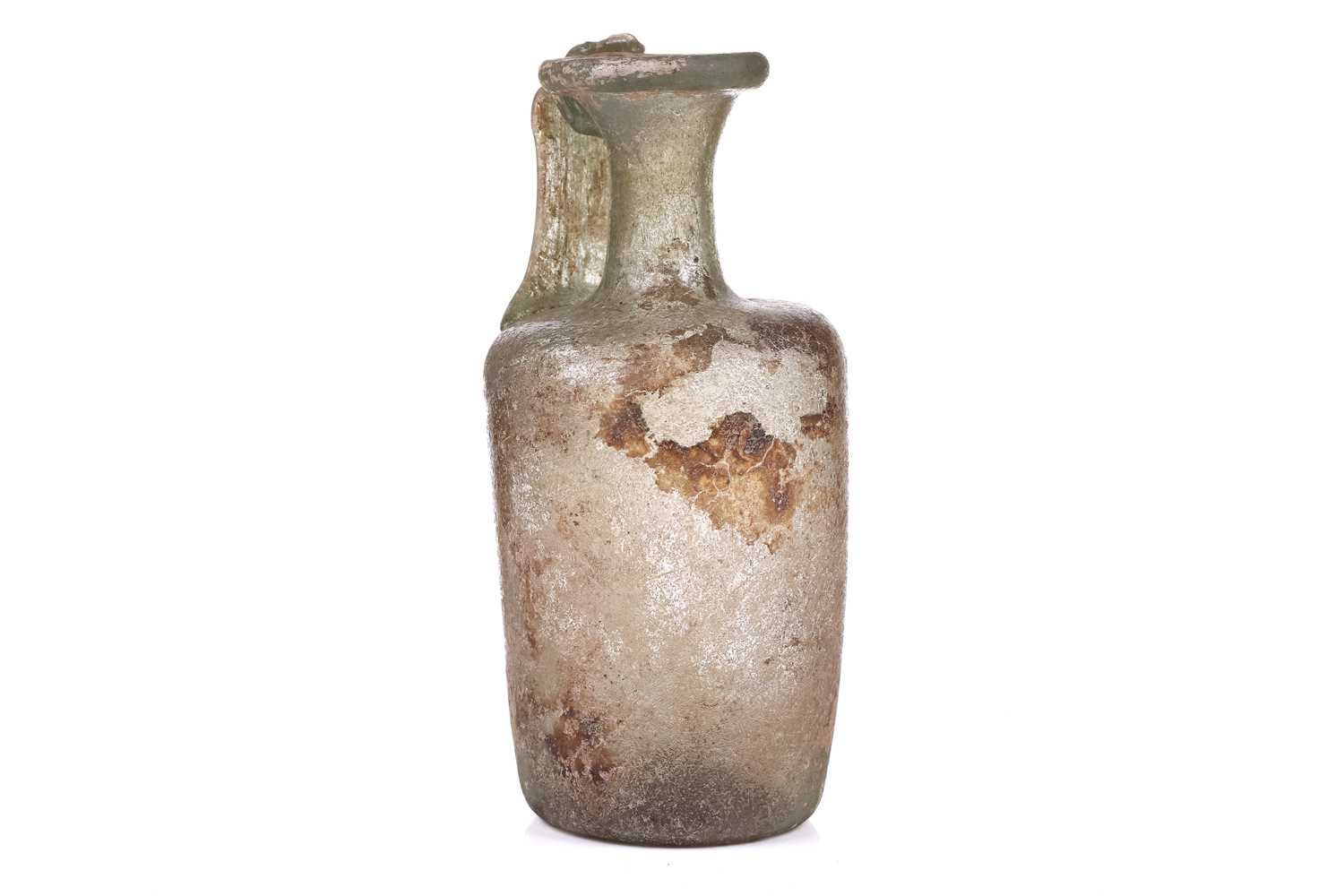 Lot 261 - A Roman glass oil ewer of slightly